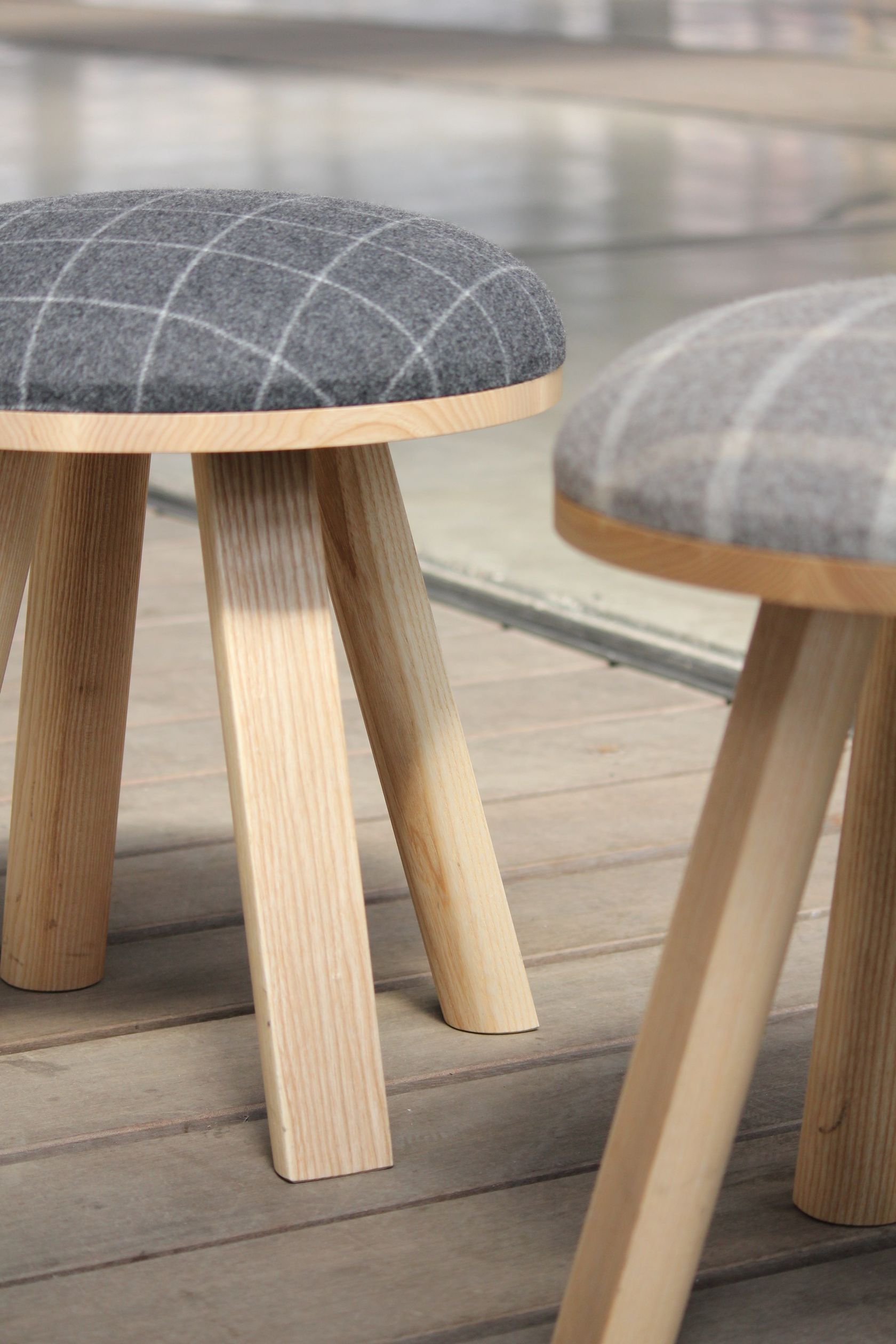 BuzziMilk Upholstered low wooden stool By BuzziSpace