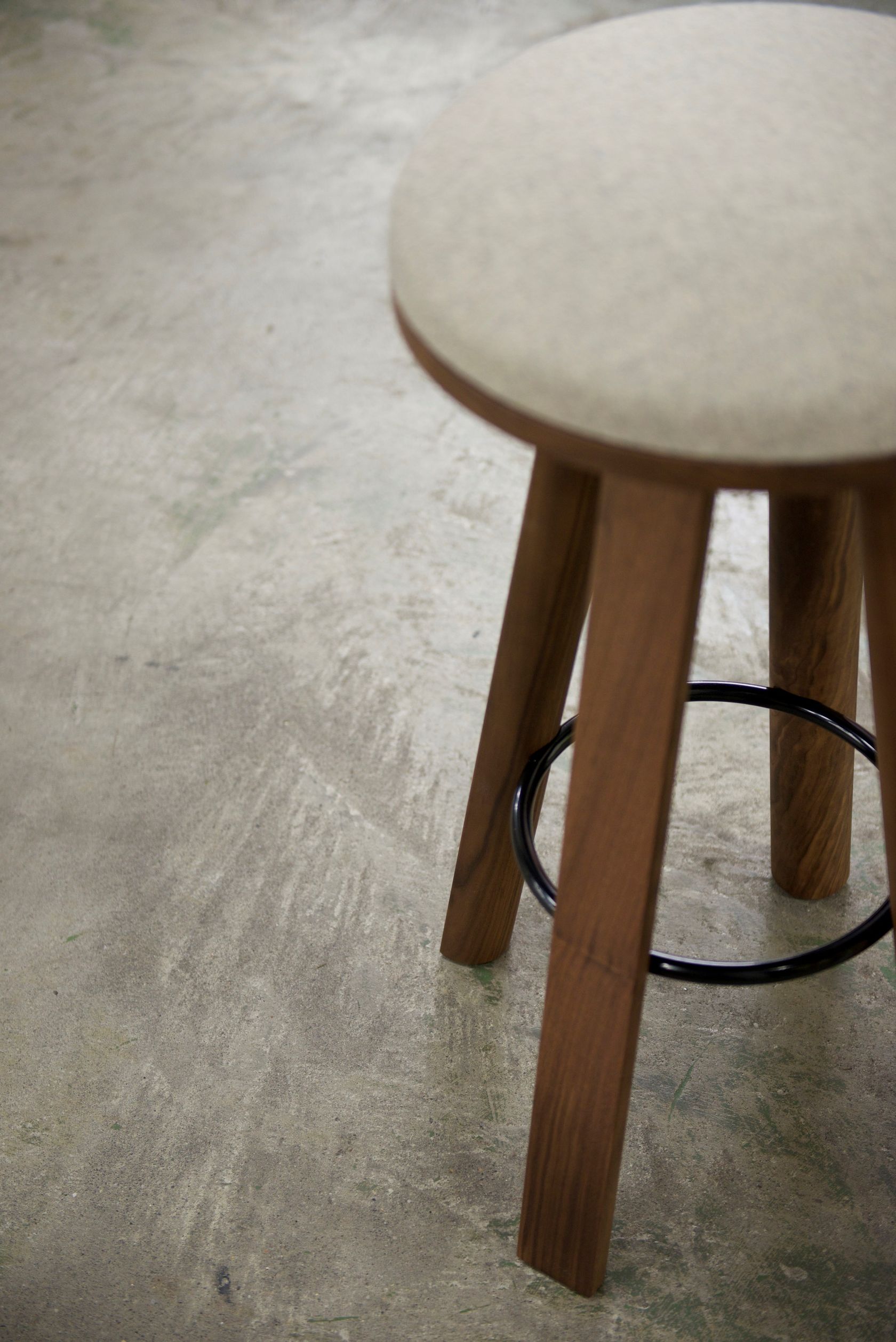 BuzziMilk Upholstered low wooden stool By BuzziSpace
