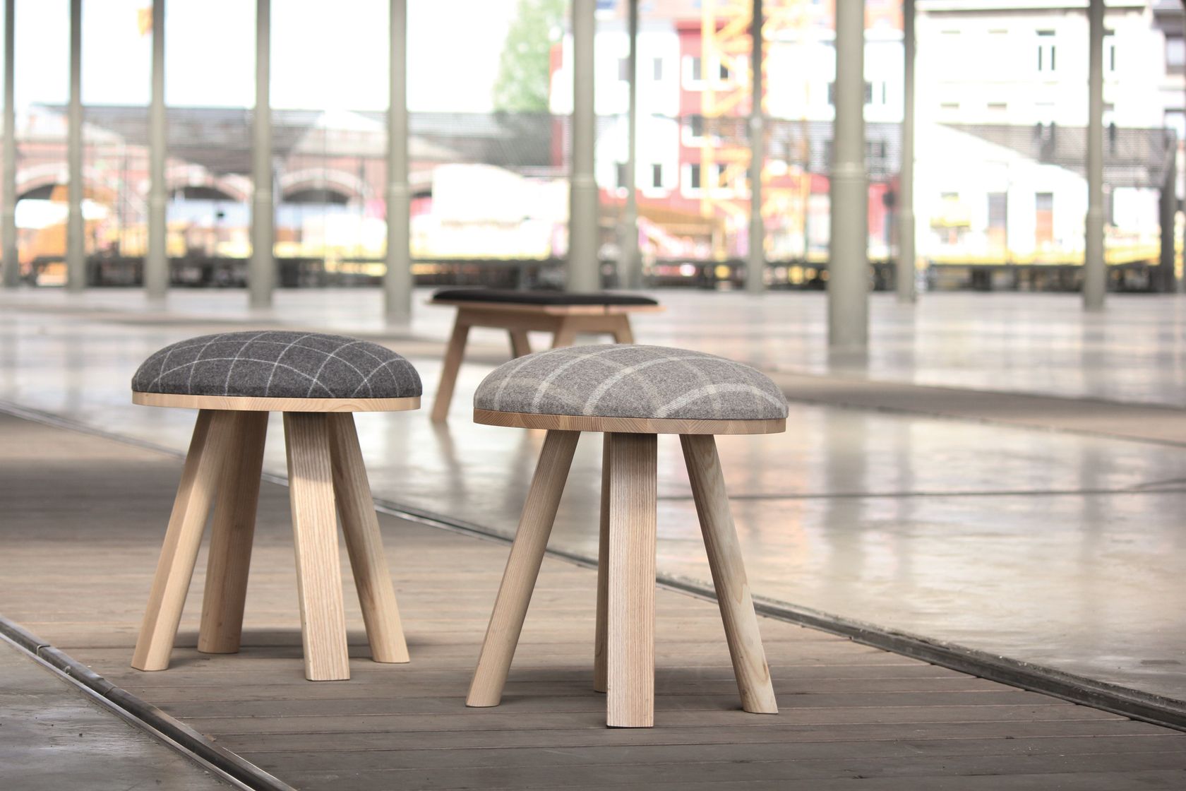 BuzziMilk Upholstered low wooden stool By BuzziSpace