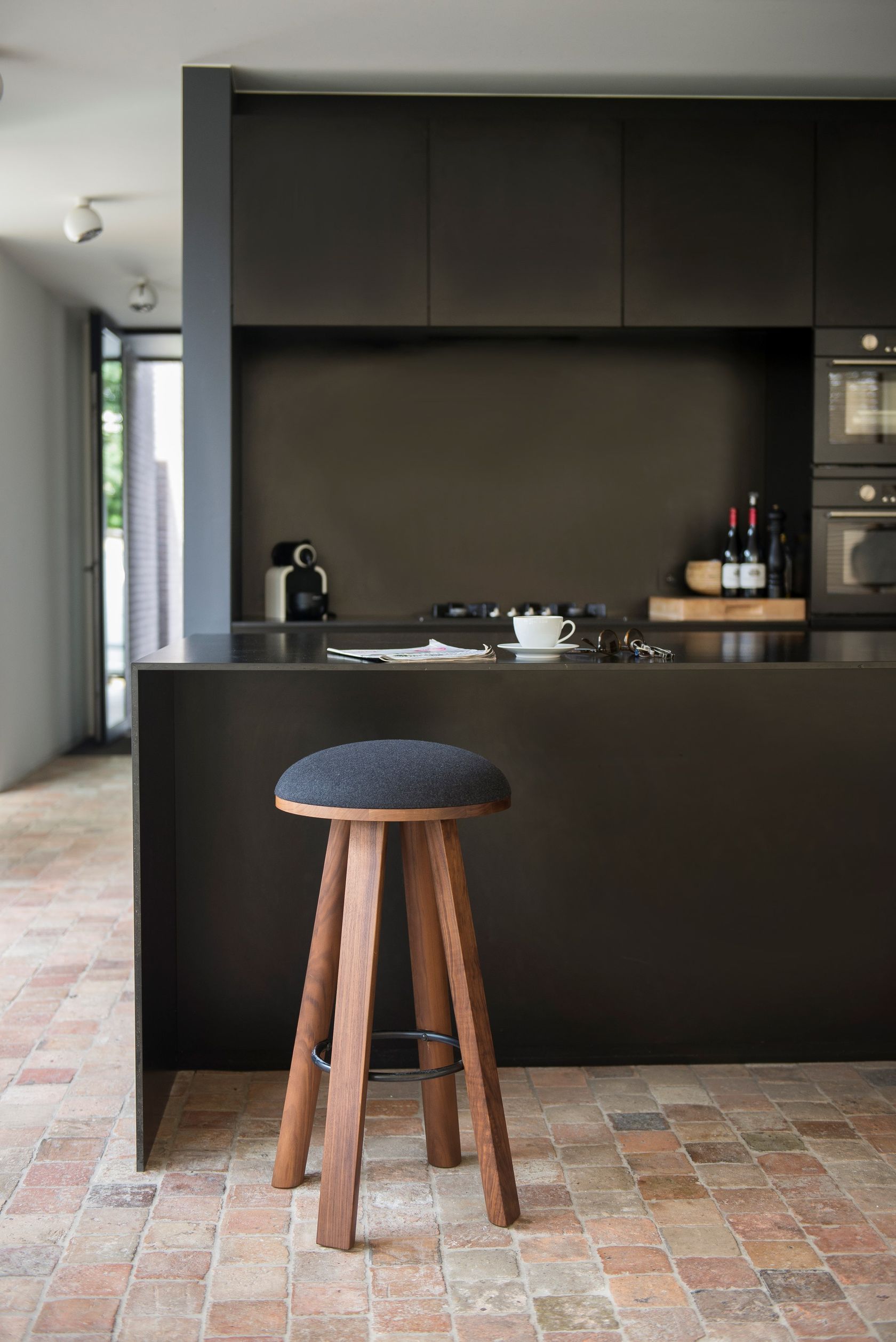 BuzziMilk Upholstered low wooden stool By BuzziSpace