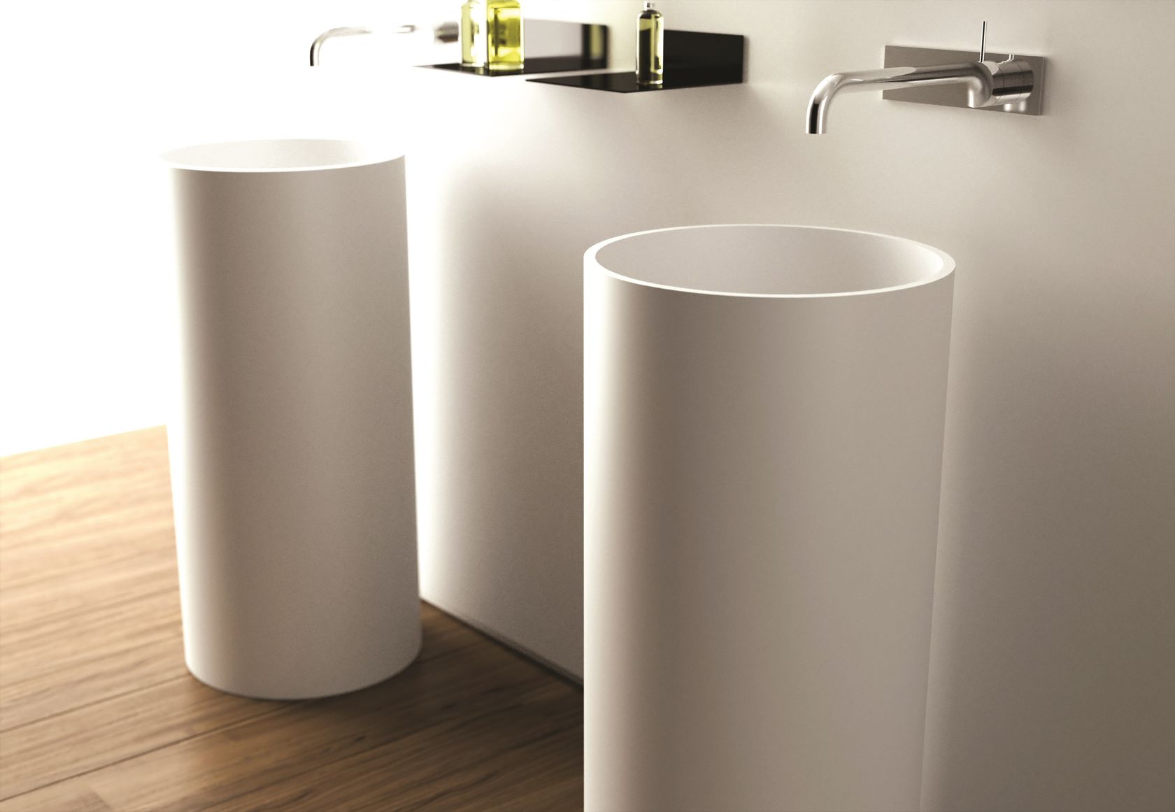 CIRCULAR TOWER Freestanding round single Solid Surface washbasin By MOMA Design
