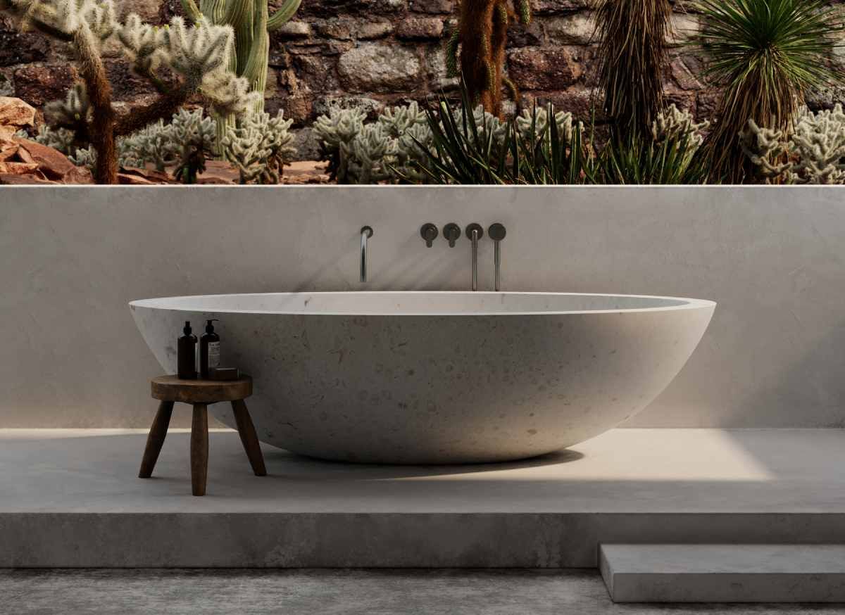 TULUM Freestanding oval natural stone bathtub By COCOON