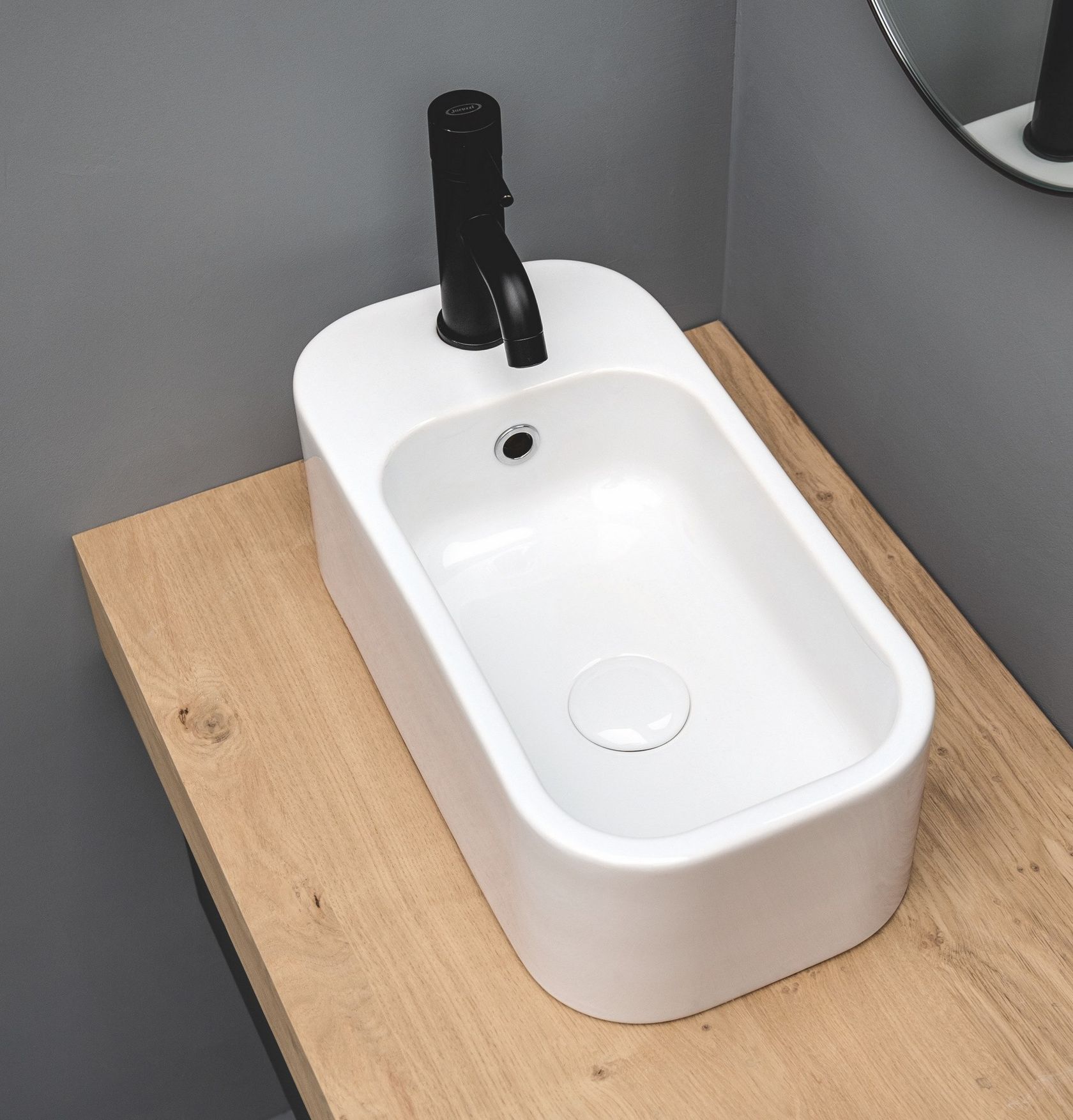 COSA | Ceramic handrinse basin By Axa design Giancarlo Angelelli