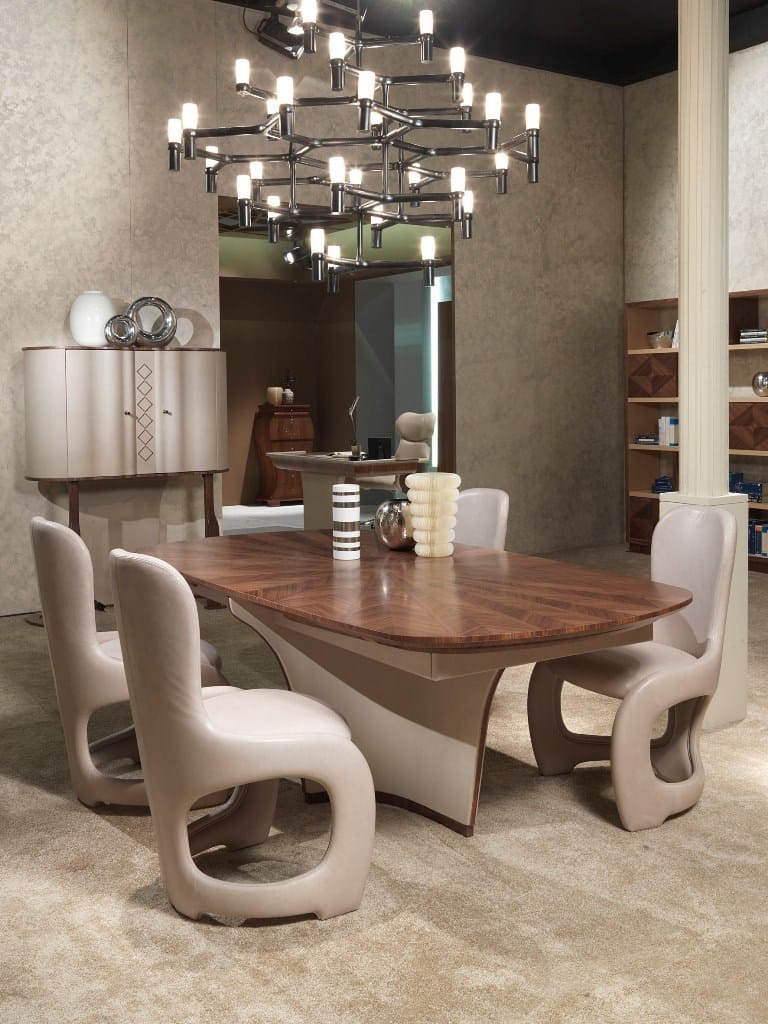 DESYO Oval walnut table By Carpanelli