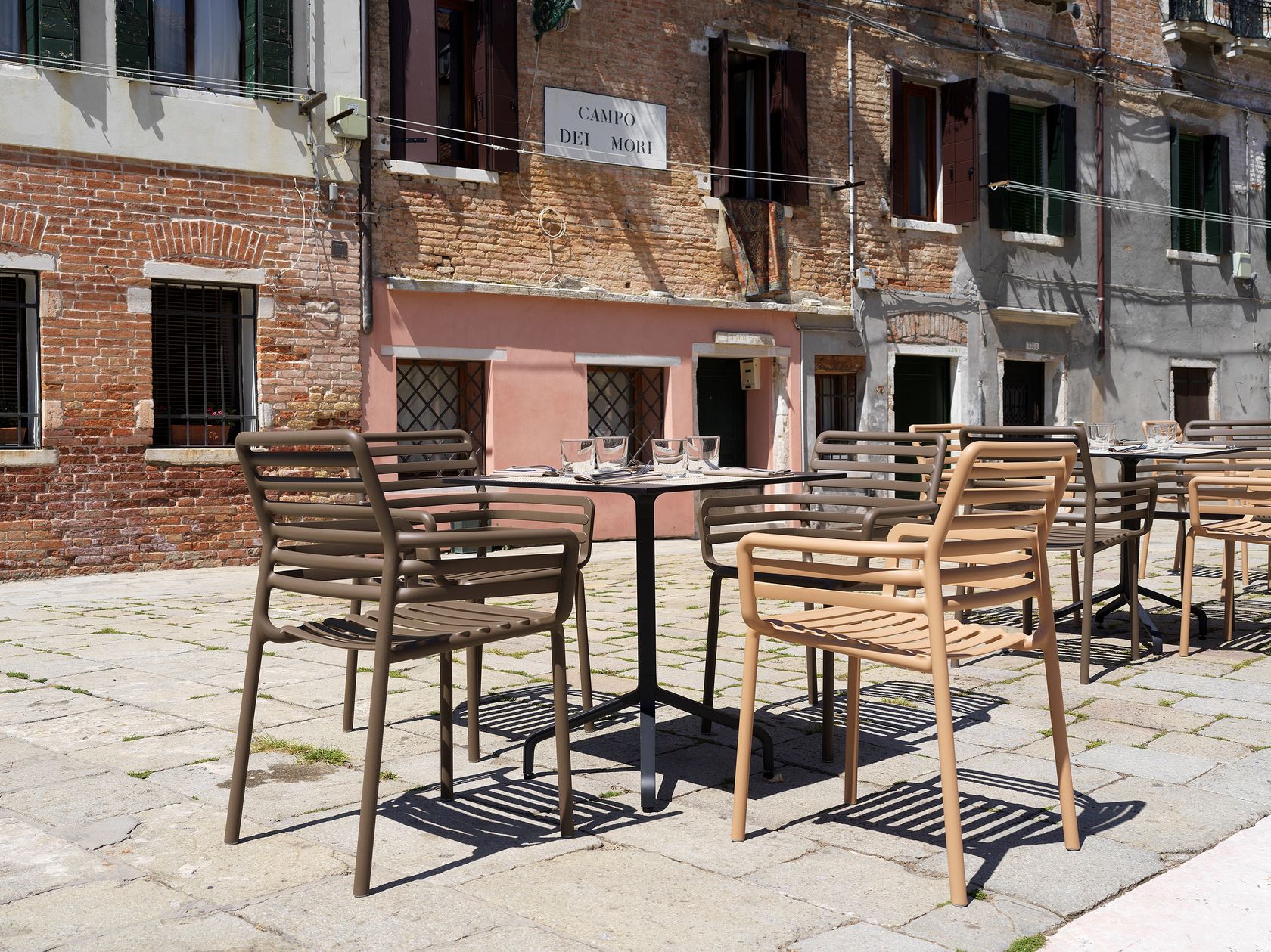 DOGA ARMCHAIR Stackable polypropylene chair with armrests By Nardi ...