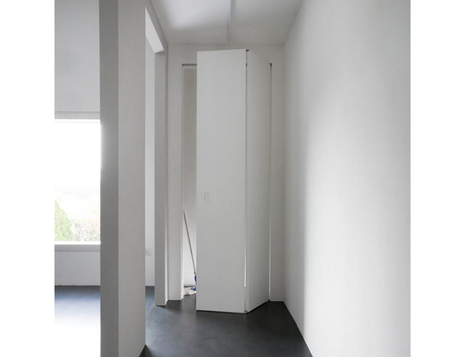FOLD 90 Porta pieghevole a filo muro By PLAN®