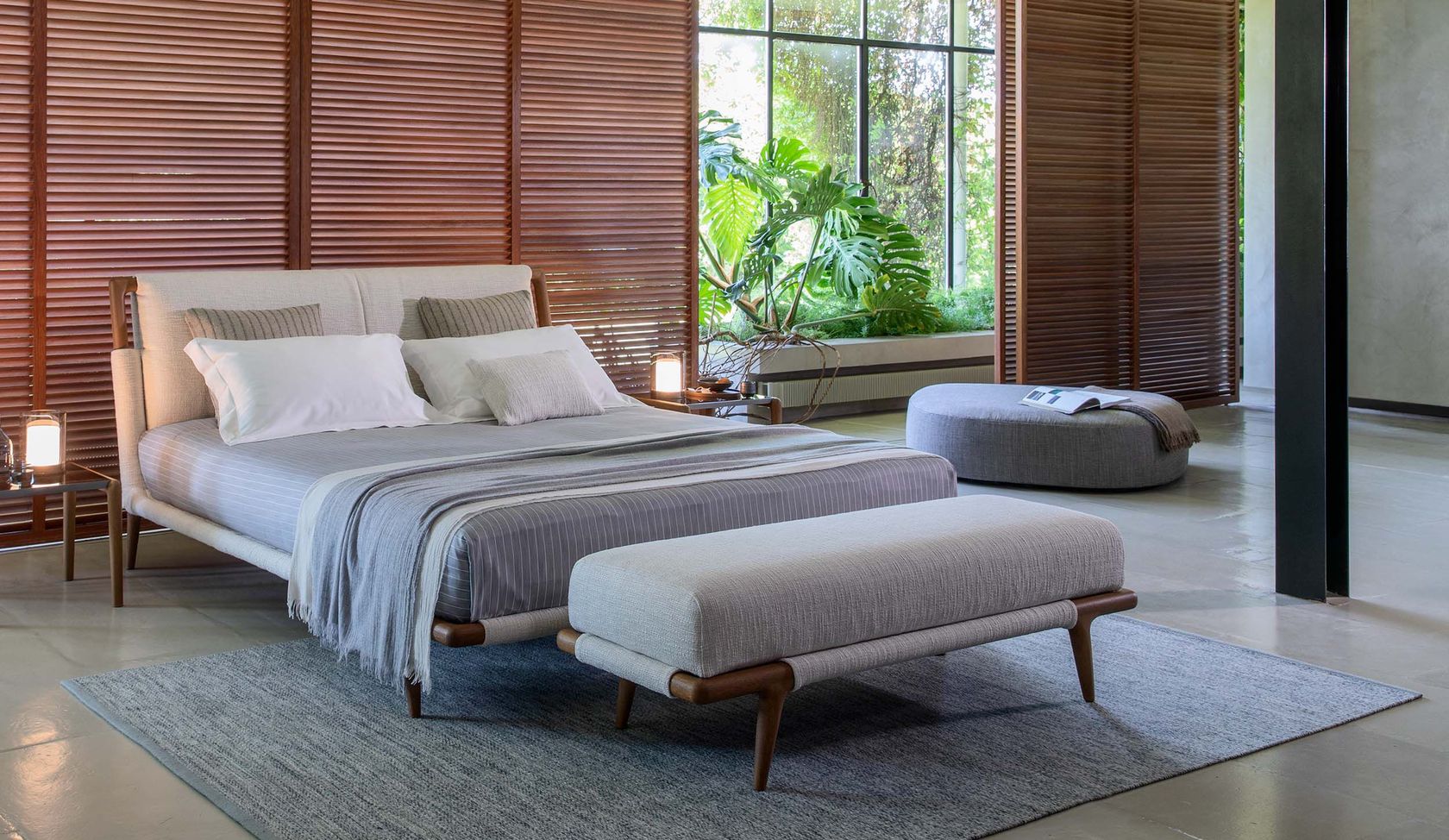 GAUDÍ Double bed with upholstered headboard By Flou