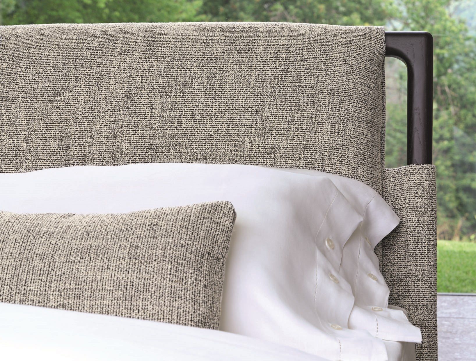 GAUDÍ Double bed with upholstered headboard By Flou