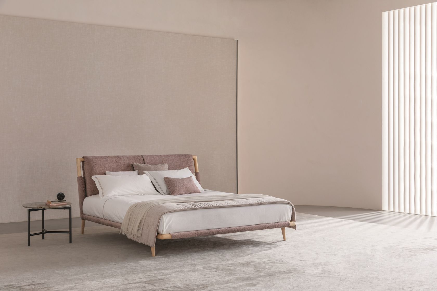GAUDÍ Double bed with upholstered headboard By Flou