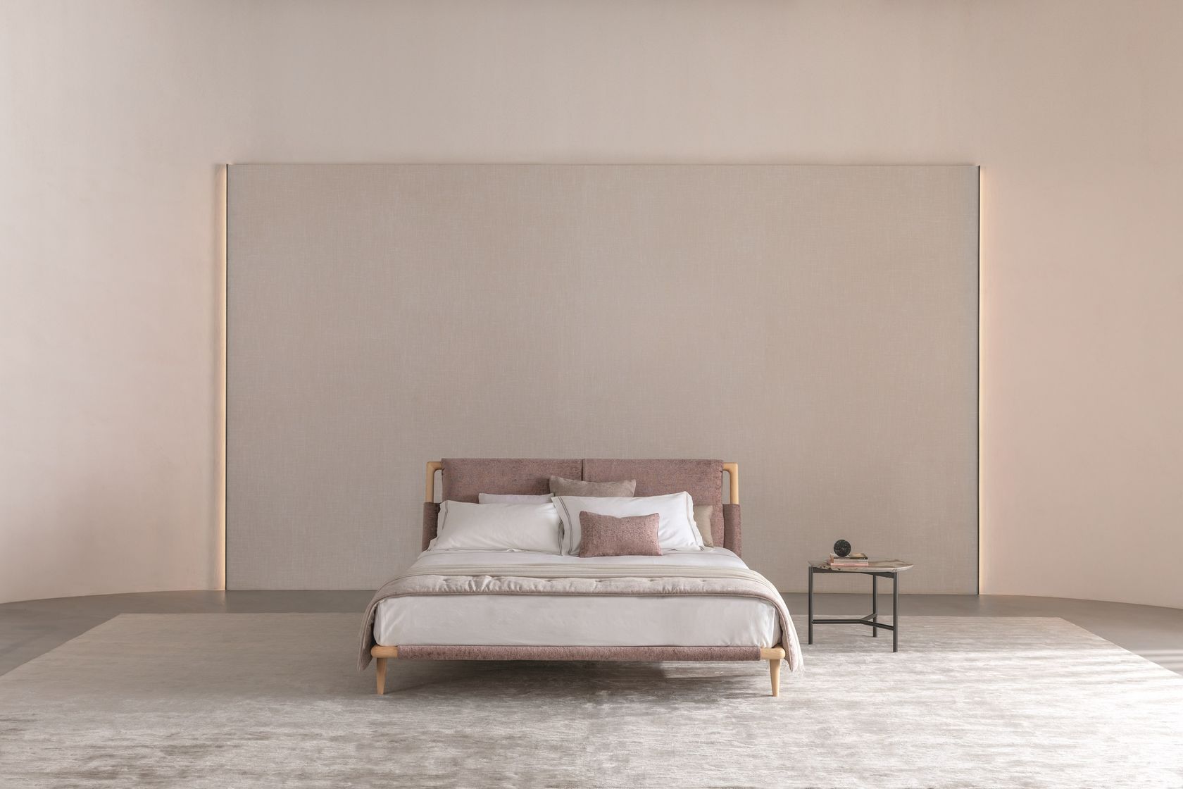 GAUDÍ Double bed with upholstered headboard By Flou