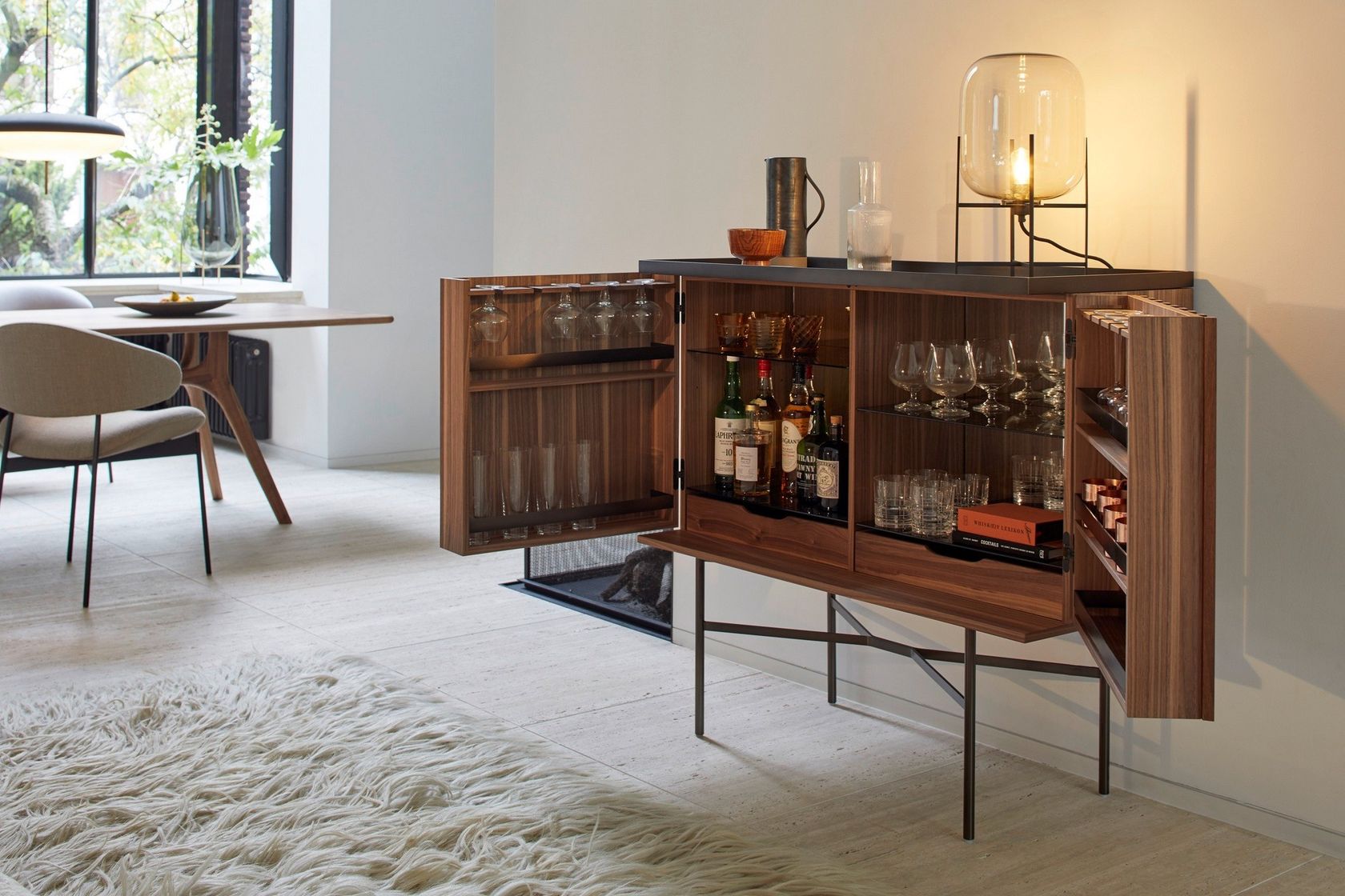 HARRI Walnut bar cabinet with integrated lighting By MORE | design Peter Fehrentz
