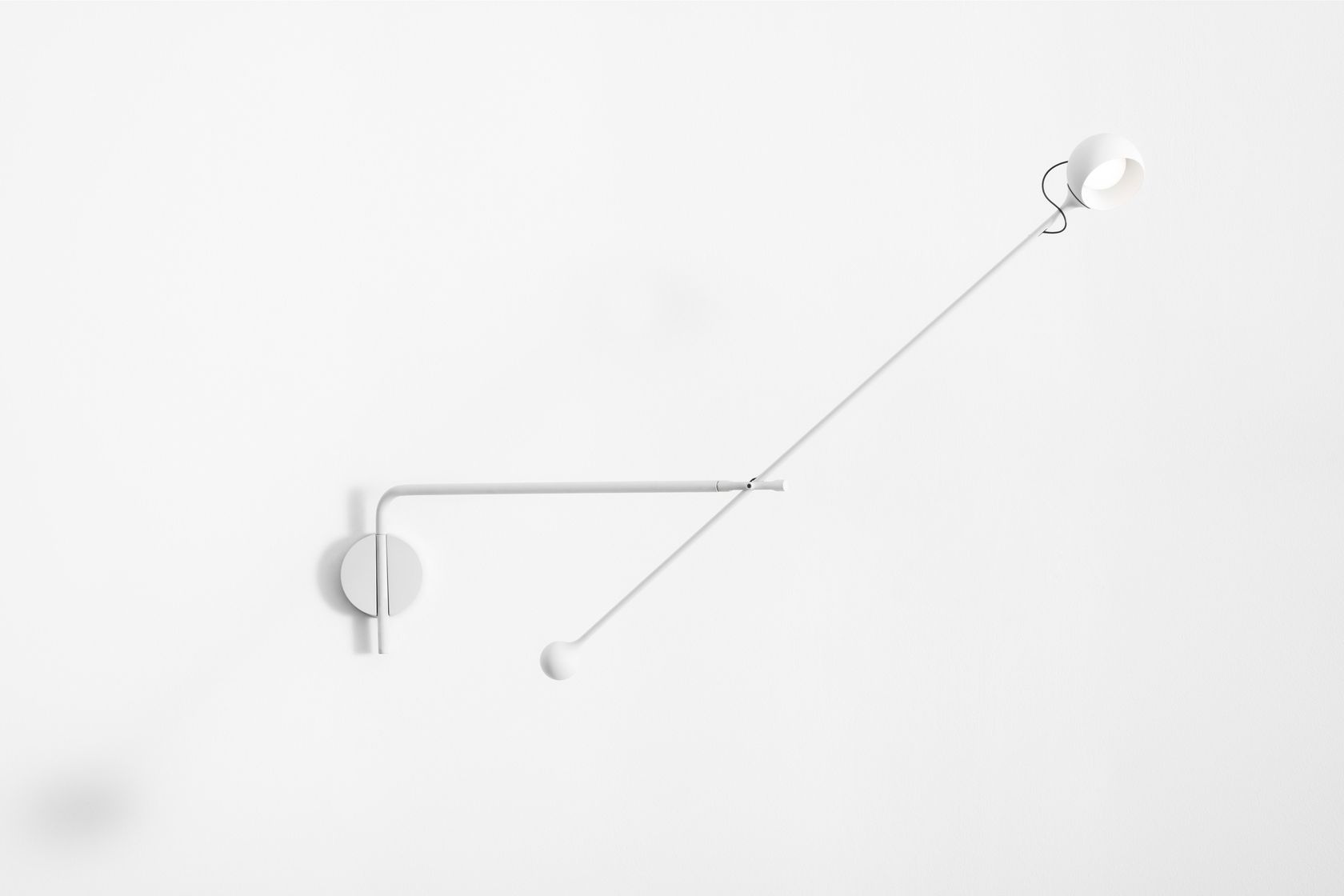 IXA Adjustable metal wall lamp with swing arm By Artemide | design Foster + Partners