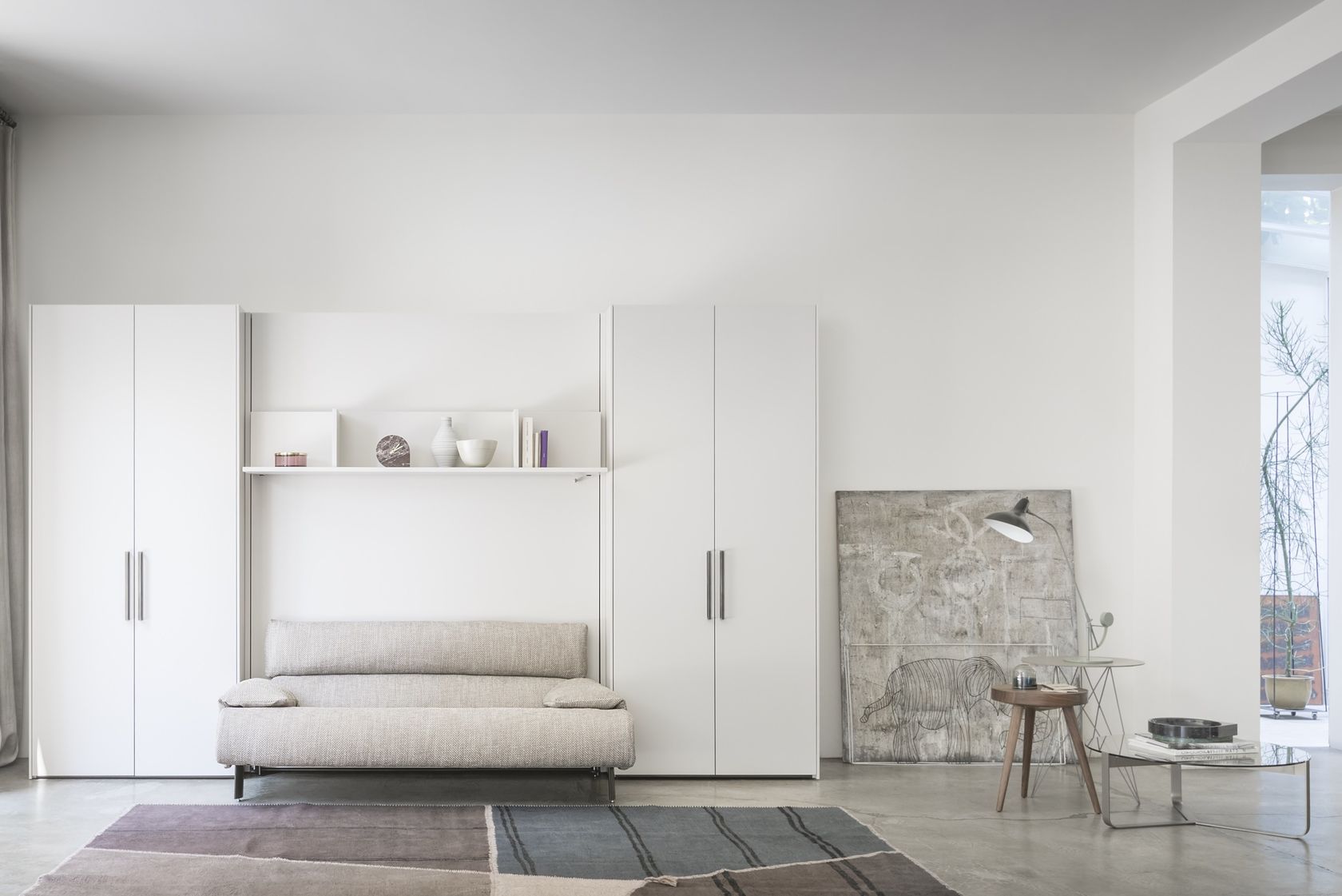 Storage wall with fold-away bed LONDON BRIDGE By Flou design Giulio Manzoni