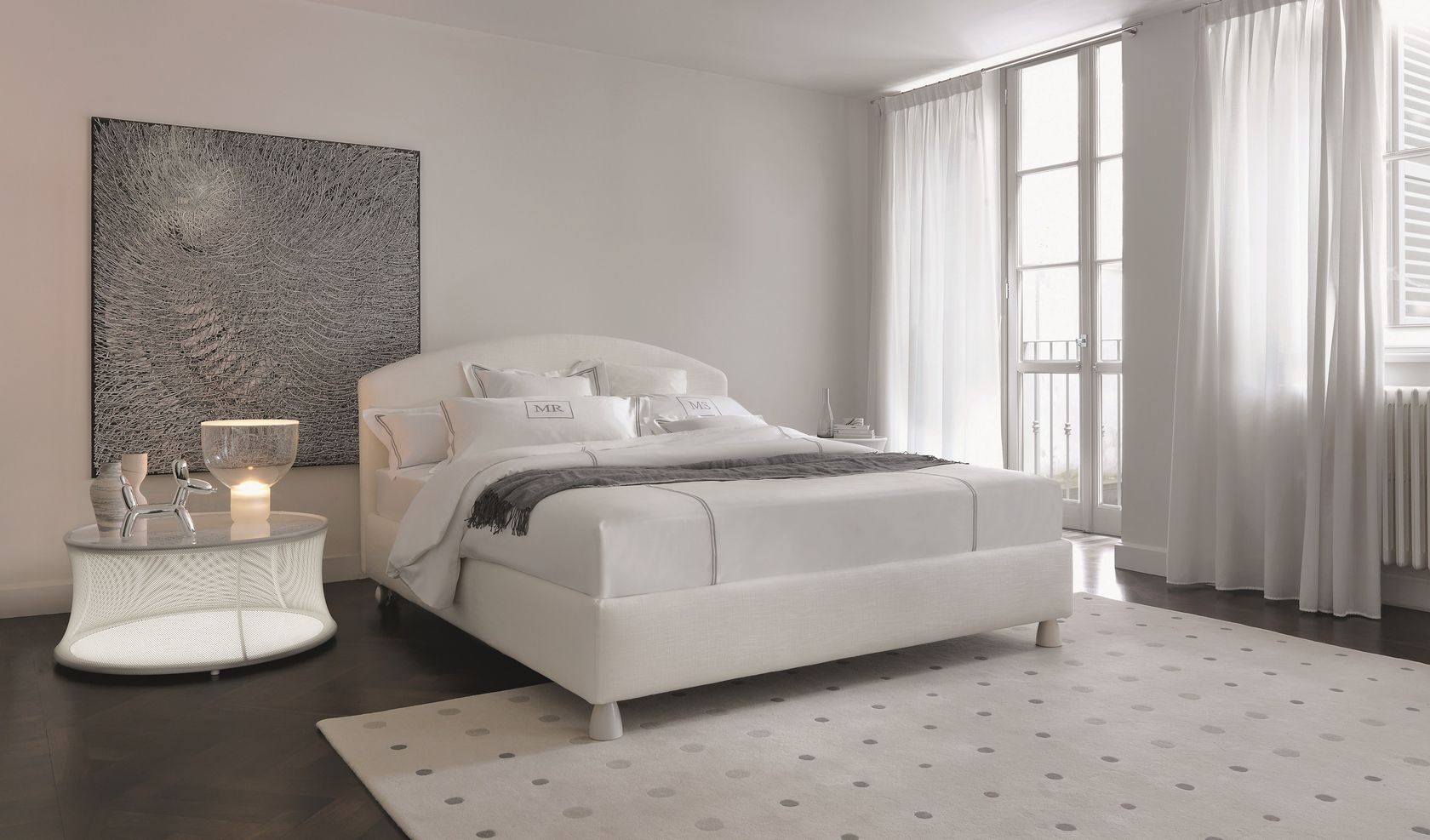 MAGNOLIA Letto matrimoniale con testiera imbottita By Flou