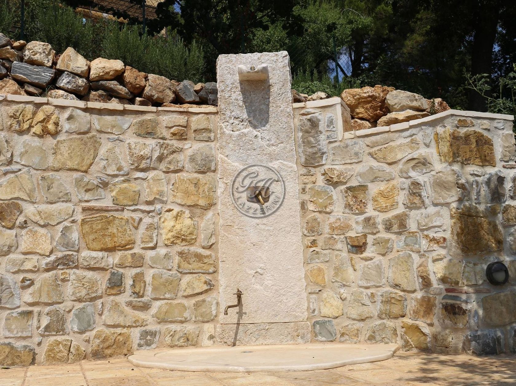 Natural stone outdoor shower Natural stone outdoor shower By GH LAZZERINI