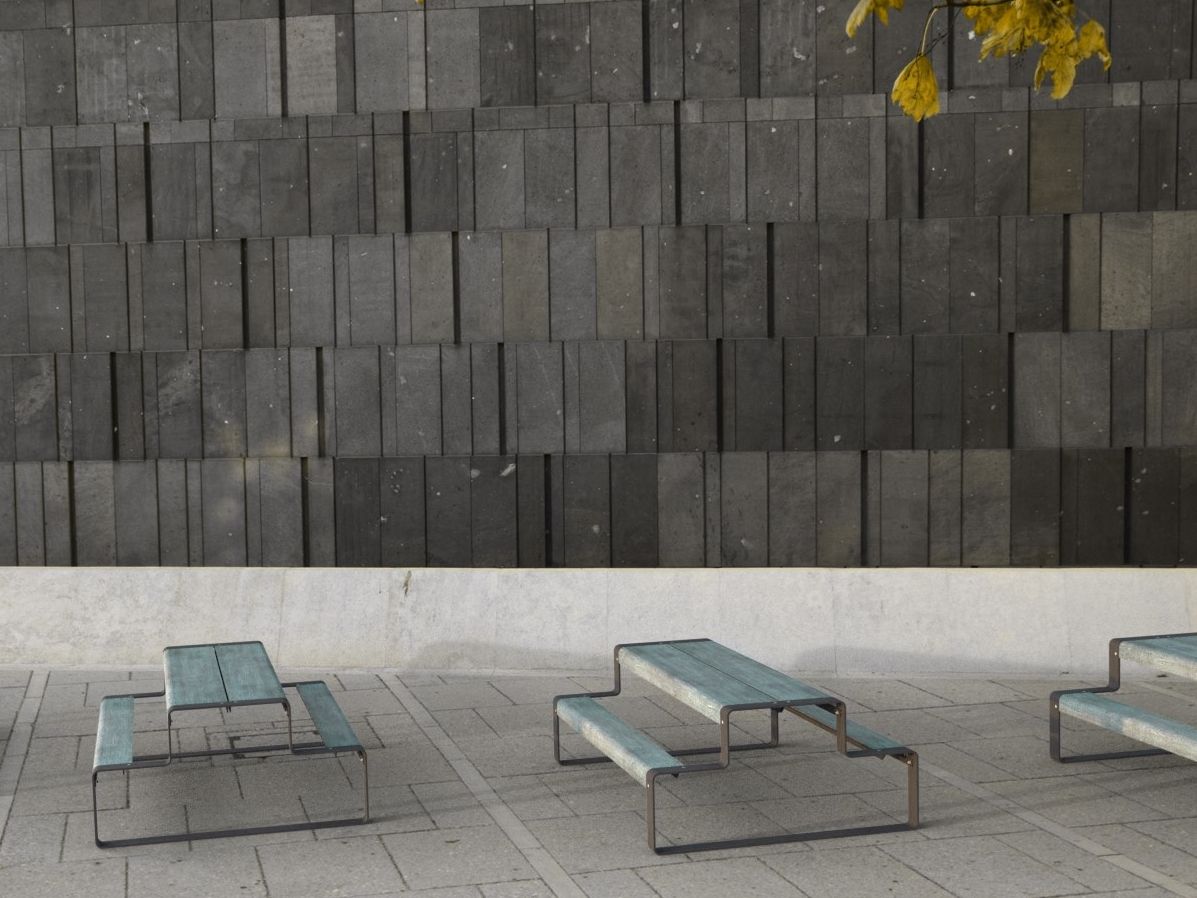 OUTLINE Steel picnic table with integrated benches By miramondo