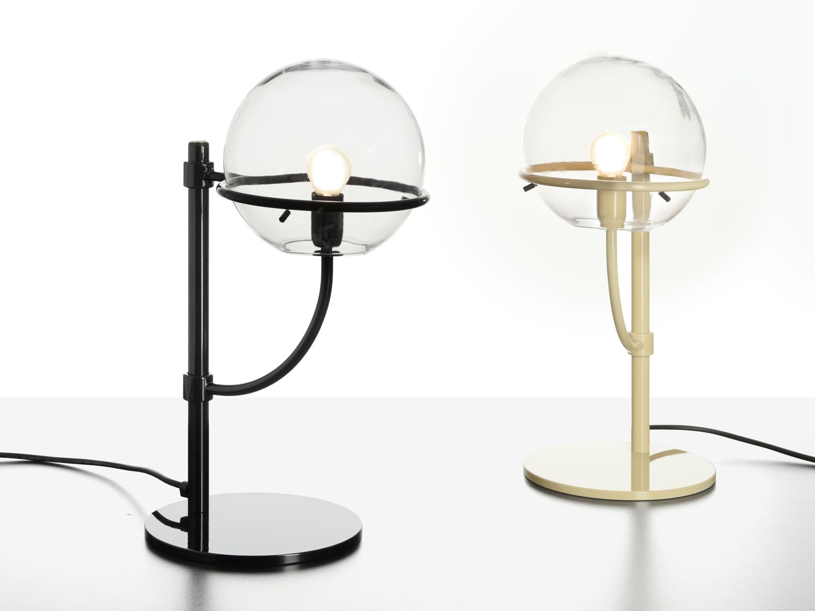 Oluce: Lampade da tavolo e da terra di design | Archiproducts