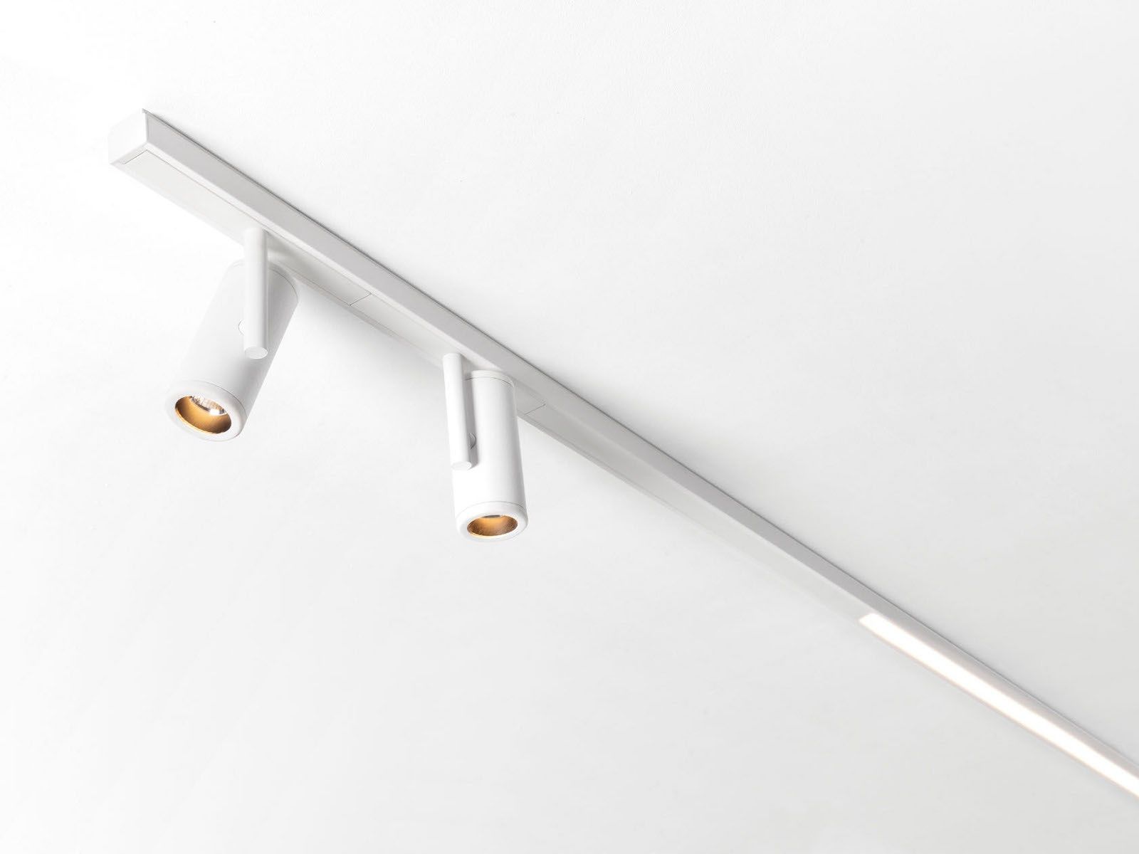 PISTA Ceiling mounted linear lighting profile By Modular Lighting Instruments