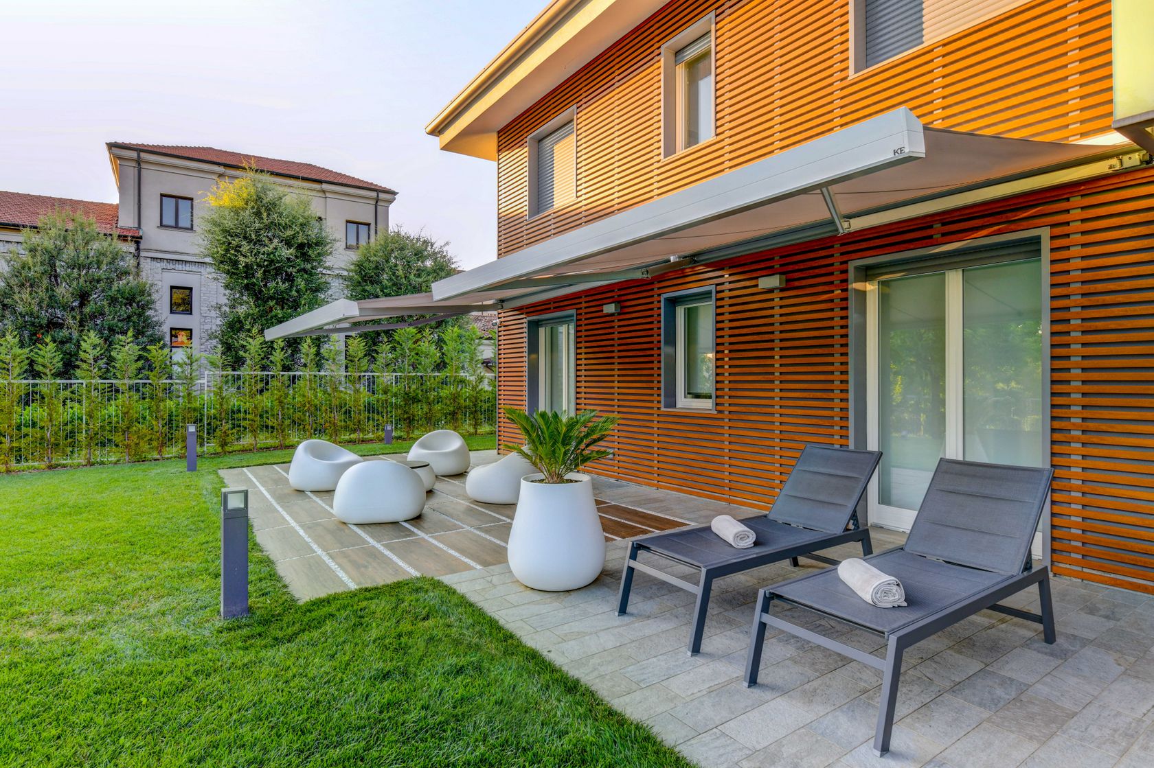 BOX AWNINGS Box motorized Folding arm awning By KE Outdoor Design