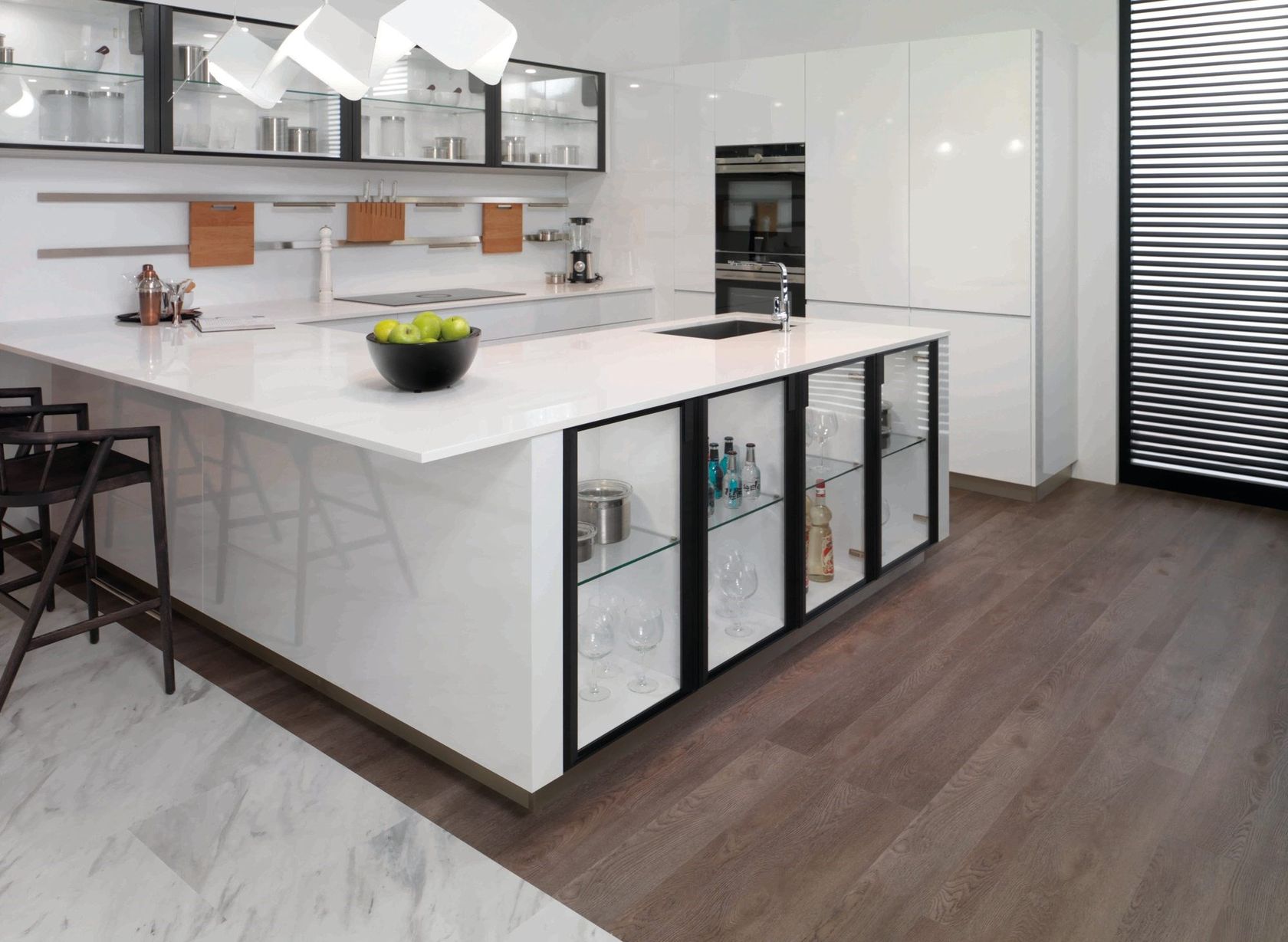 Contemporary style wood-product fitted kitchen with integrated handles ...