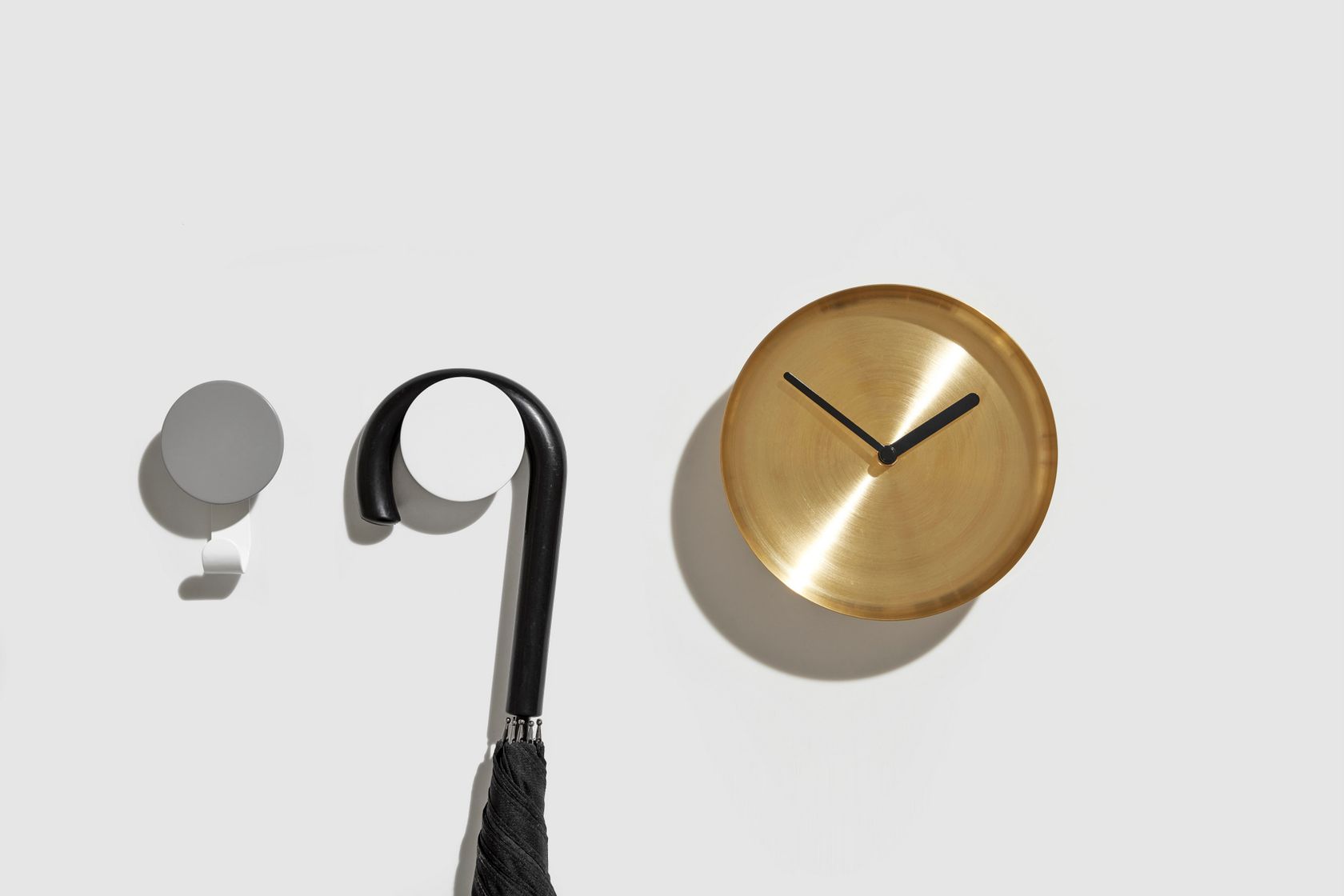 Wall-mounted brass clock RADIAL By DesignByThem