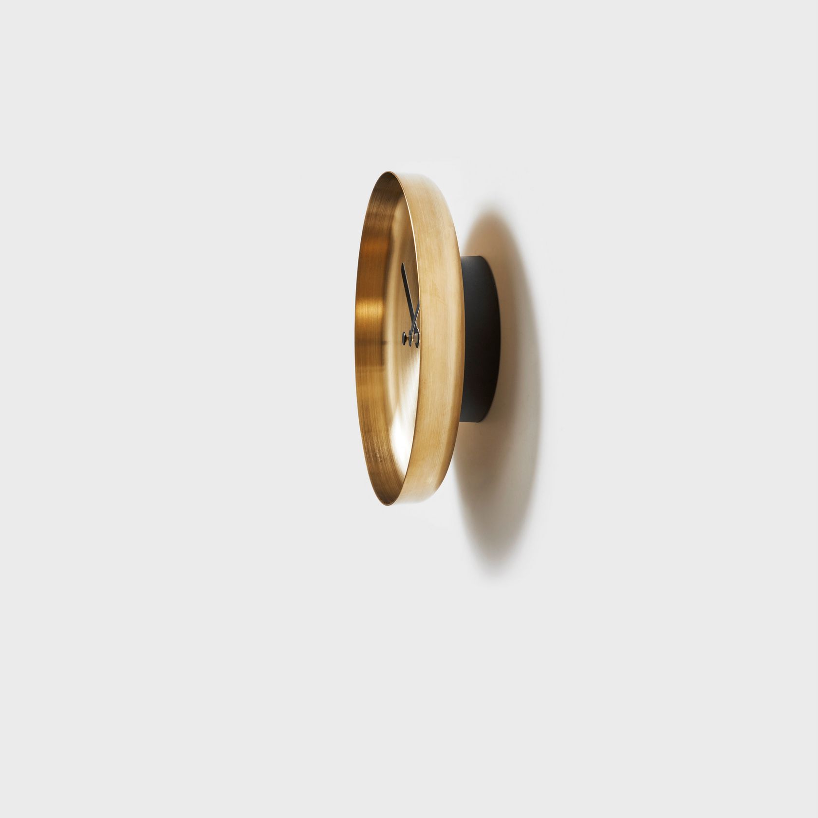 Wall-mounted brass clock RADIAL By DesignByThem