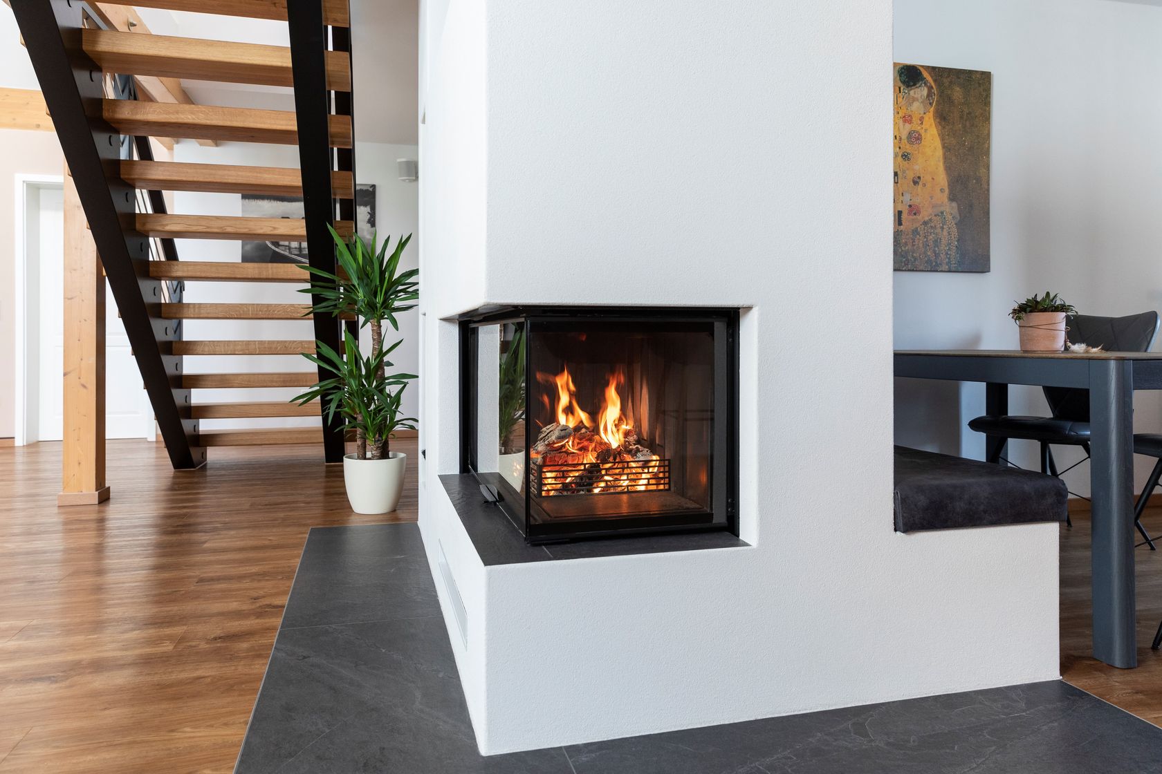 RII Corner wood-burning fireplace By RUEGG