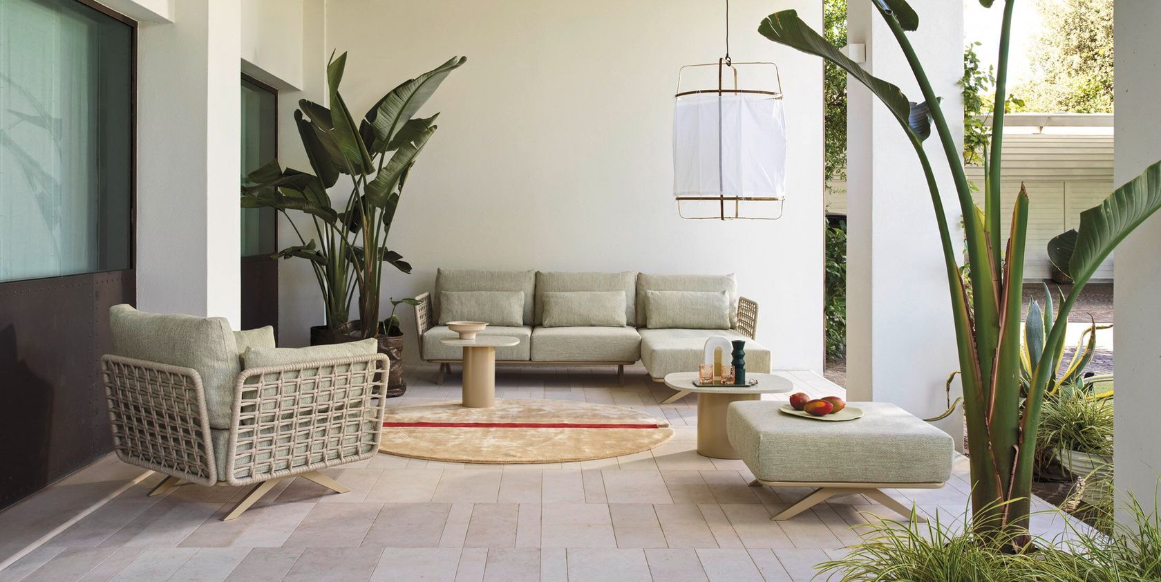 ARMÀN Armchair woven with polyester rope and armrests By Roberti