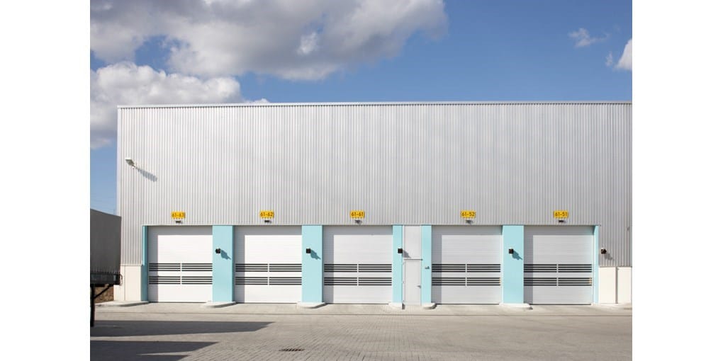 Sectional door Slatted exterior doors By ASSA ABLOY Entrance Systems