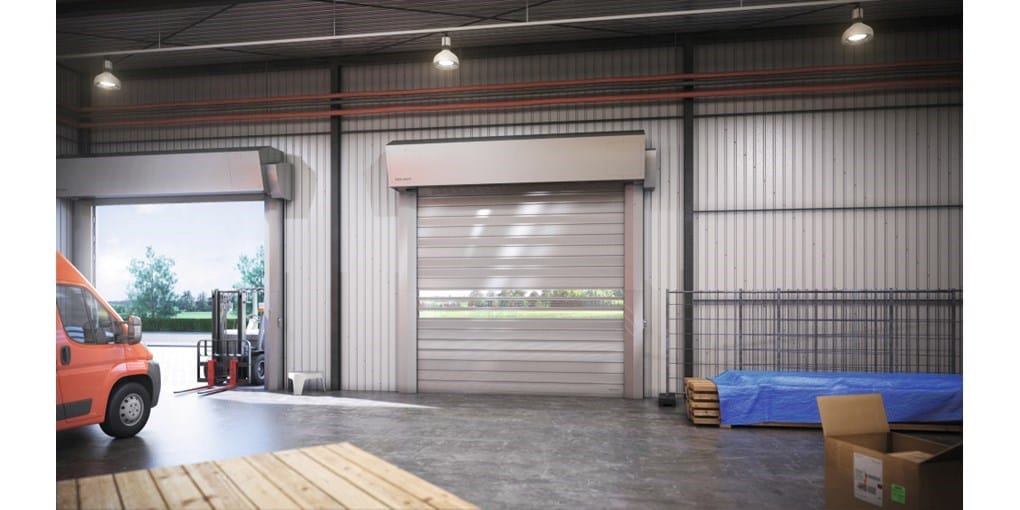 Slatted exterior doors Sectional door By ASSA ABLOY Entrance Systems