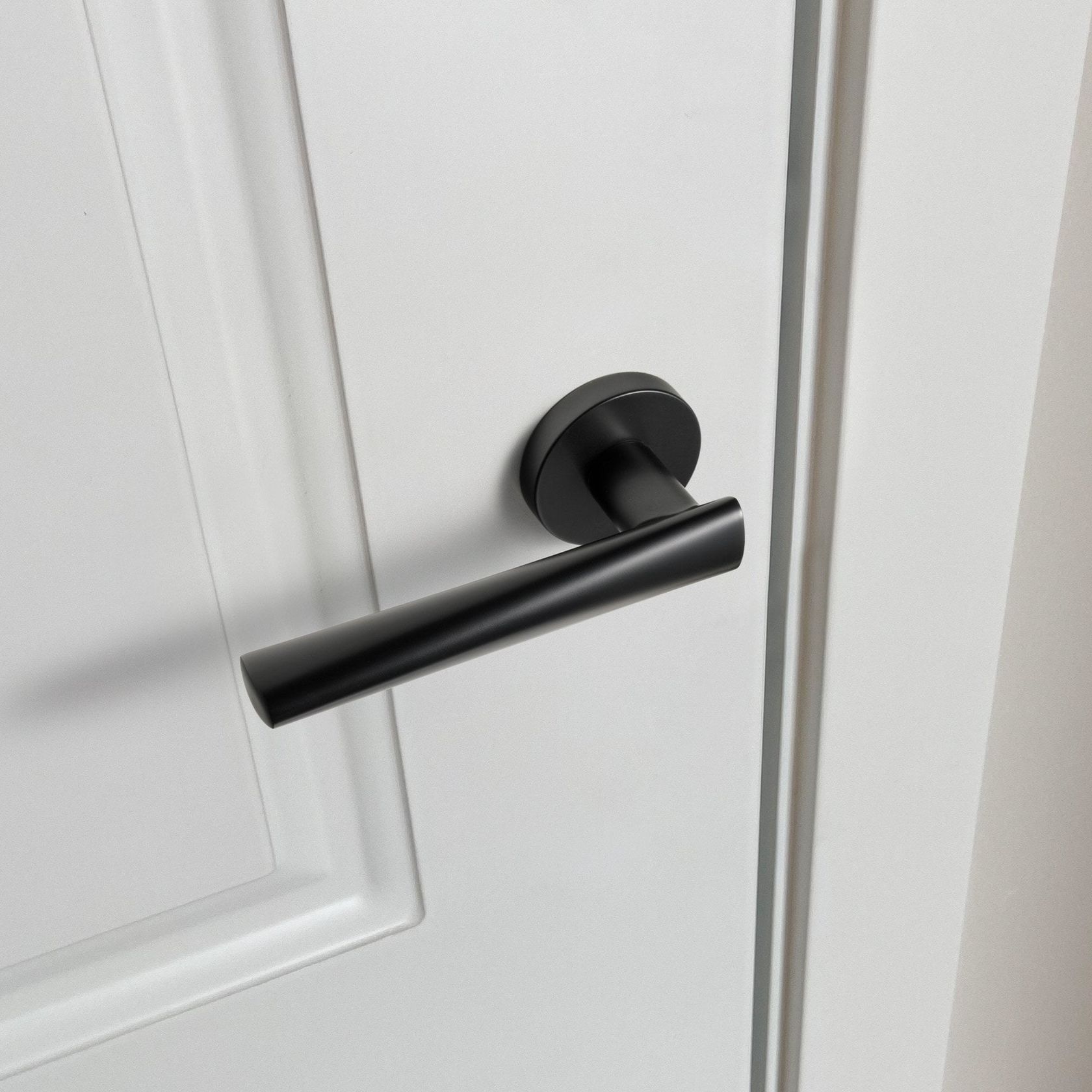 URBAN Metal door handle on rose By LUSSO