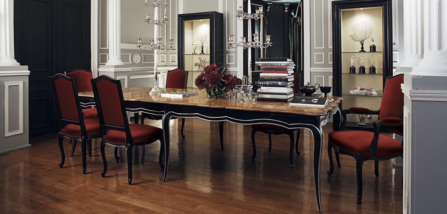 VOLUTES Extending rectangular cherry wood table By Roche Bobois