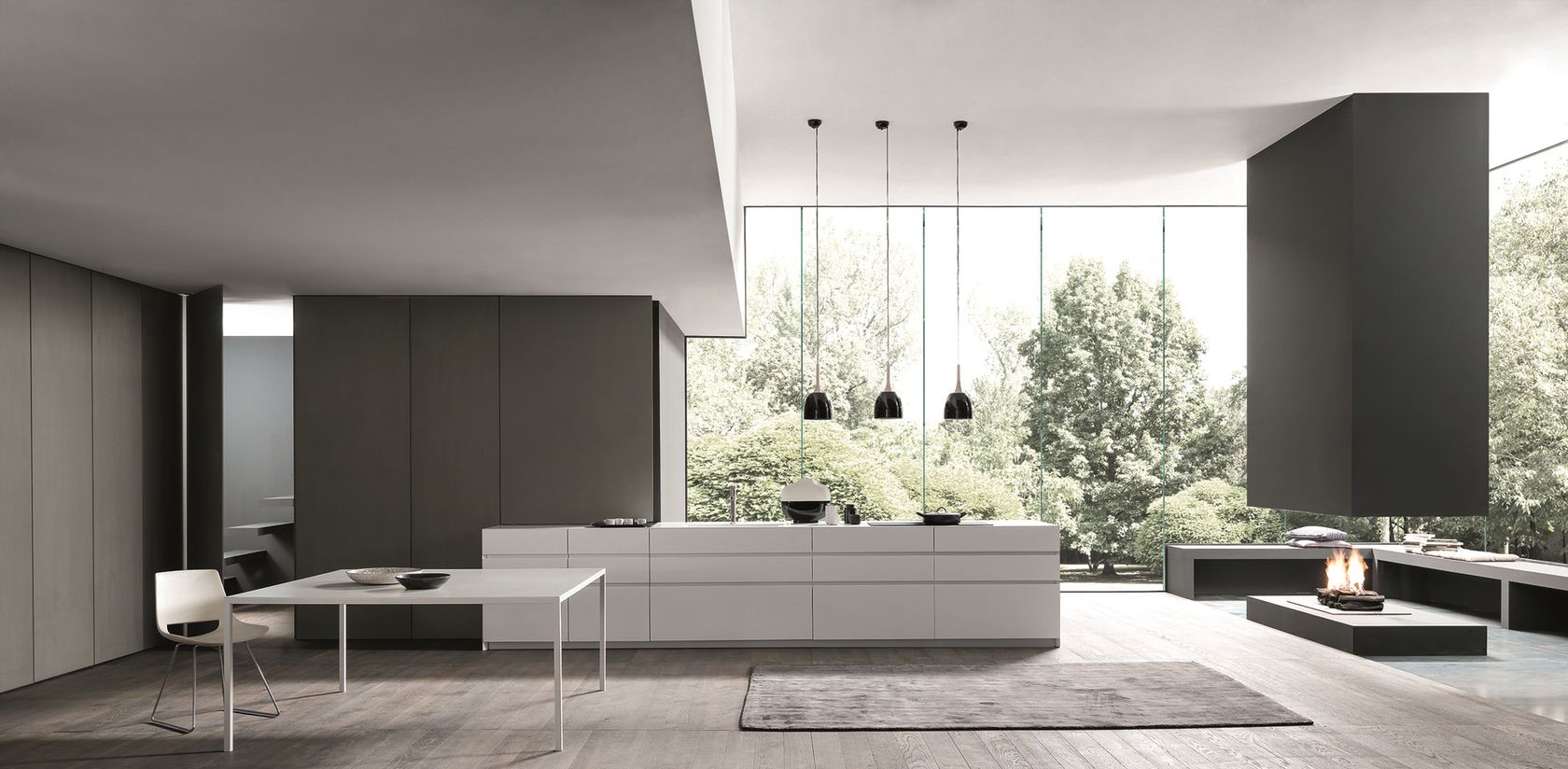FLY Corian® kitchen with peninsula By MODULNOVA | design Andrea Bassanello