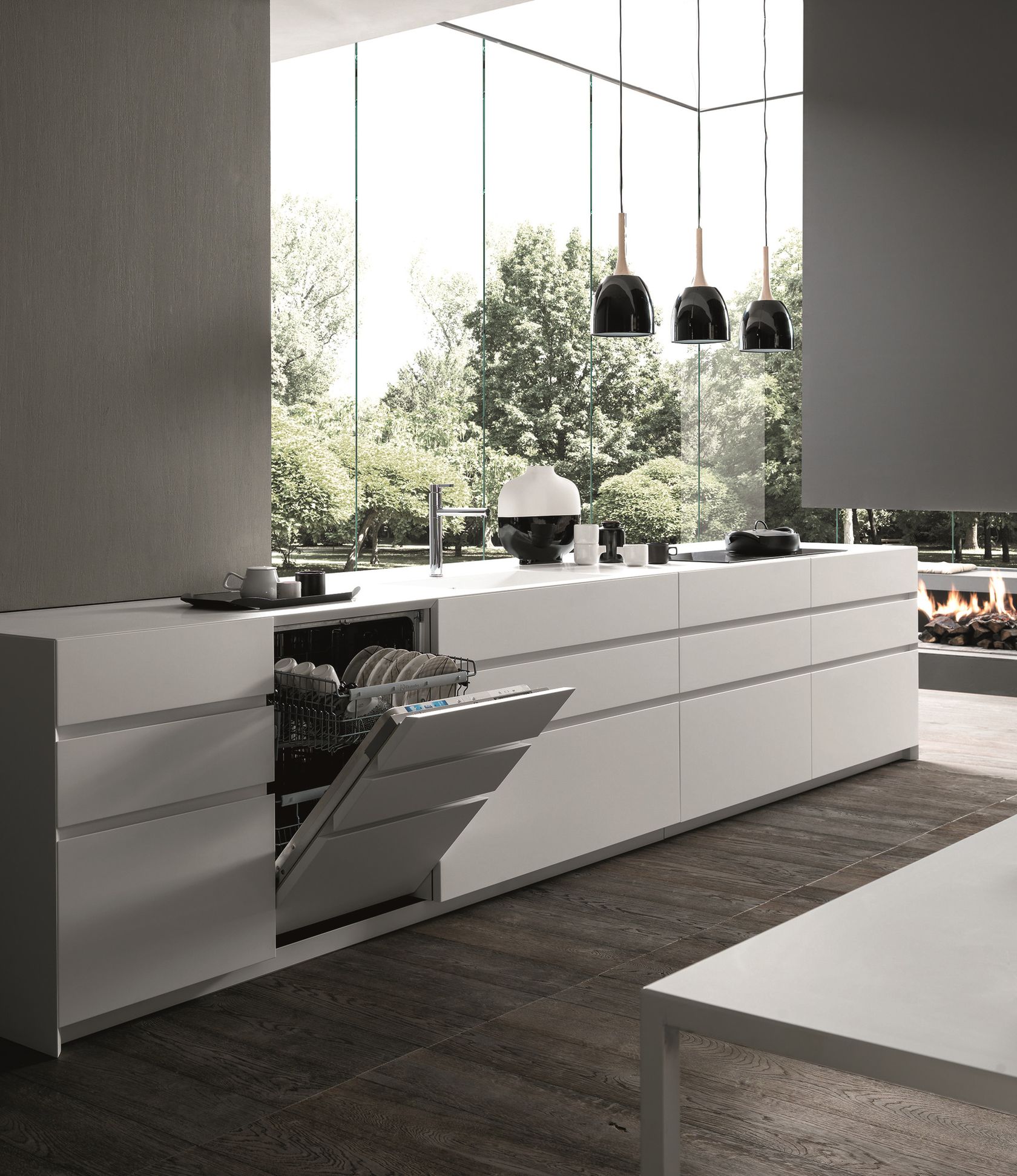 FLY Corian® kitchen with peninsula By MODULNOVA | design Andrea Bassanello