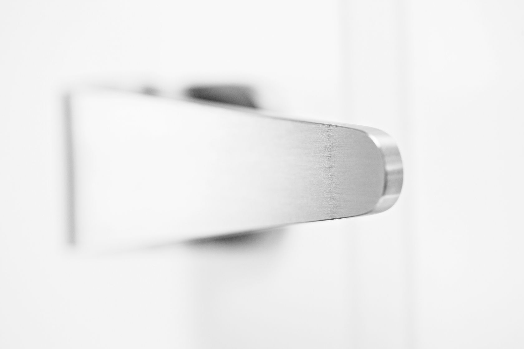FOLD Stainless steel door handle with lock By Formani | design Tord Boontje
