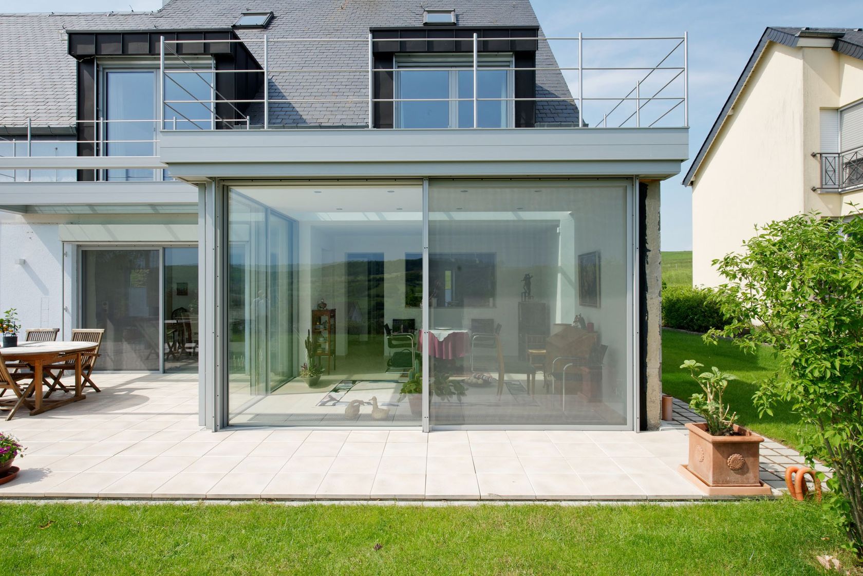 Baie vitrée coulissante en aluminium KELLER GLASSHOUSE® By Keller