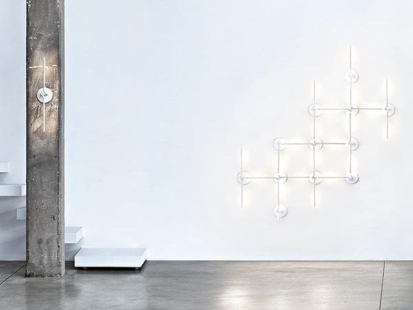 Adjustable wall lamp LIGHTSPRING By FLOS design Ron Gilad