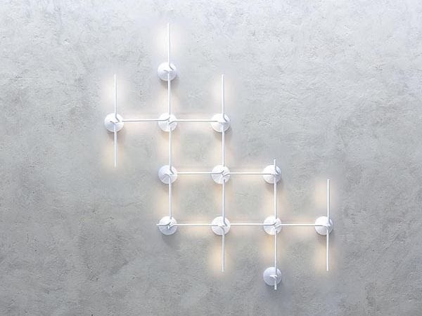 Adjustable wall lamp LIGHTSPRING By FLOS design Ron Gilad