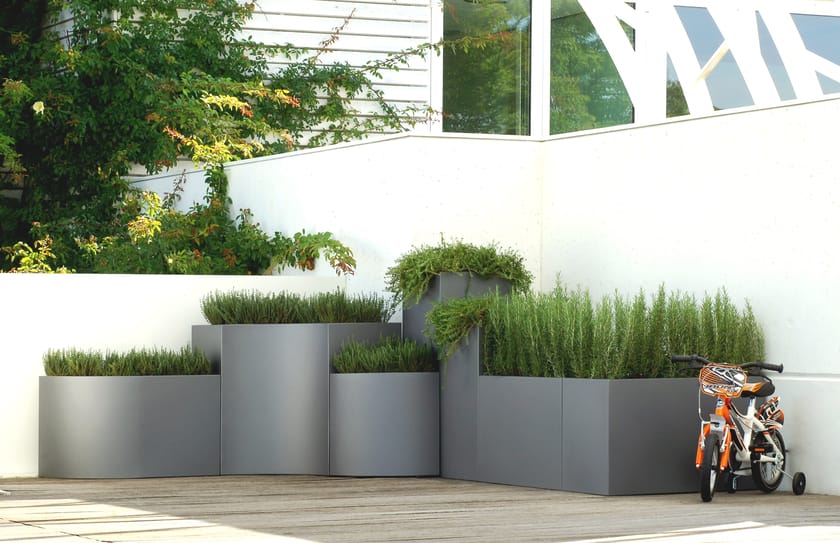 A Modular stainless steel planter By BLOSS