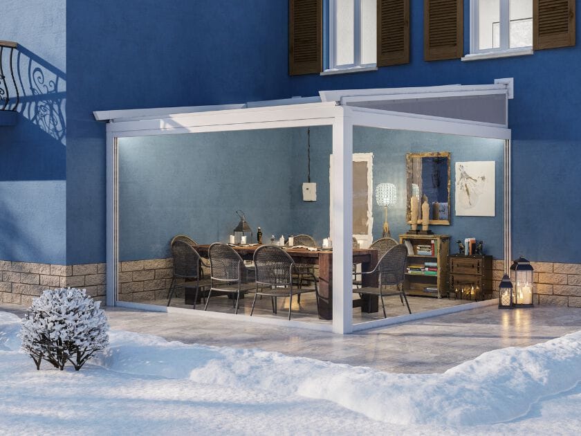 DILETTA KOMFORT Wall-mounted aluminium and PVC pergola with winding cloth system By Belle Pergole