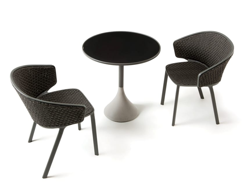 CONCRETO Round teak garden table By Ethimo | design Luca Nichetto