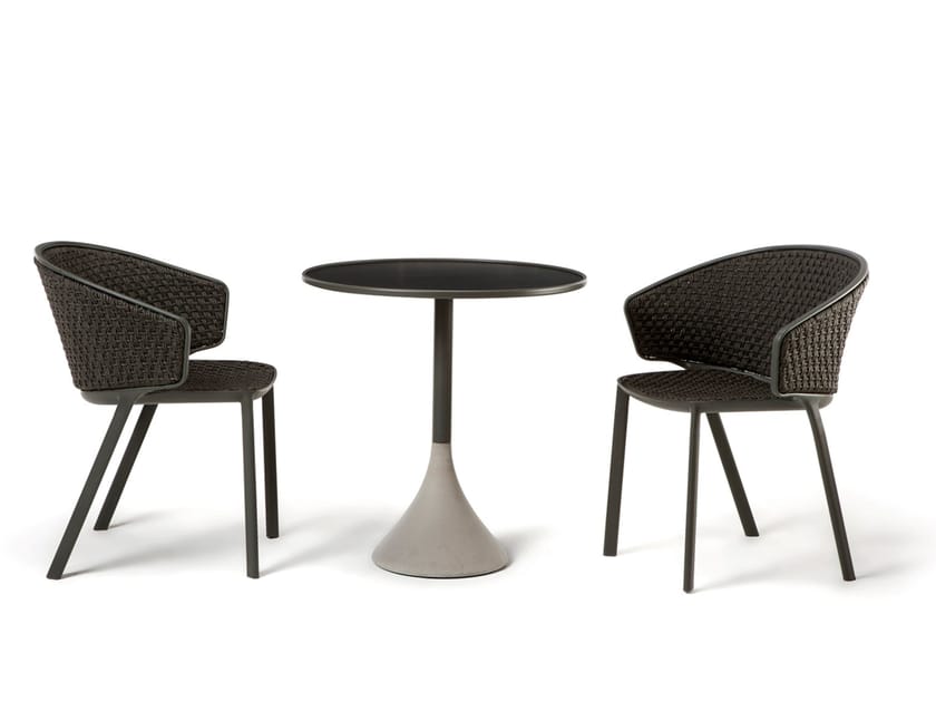 CONCRETO Round teak garden table By Ethimo | design Luca Nichetto