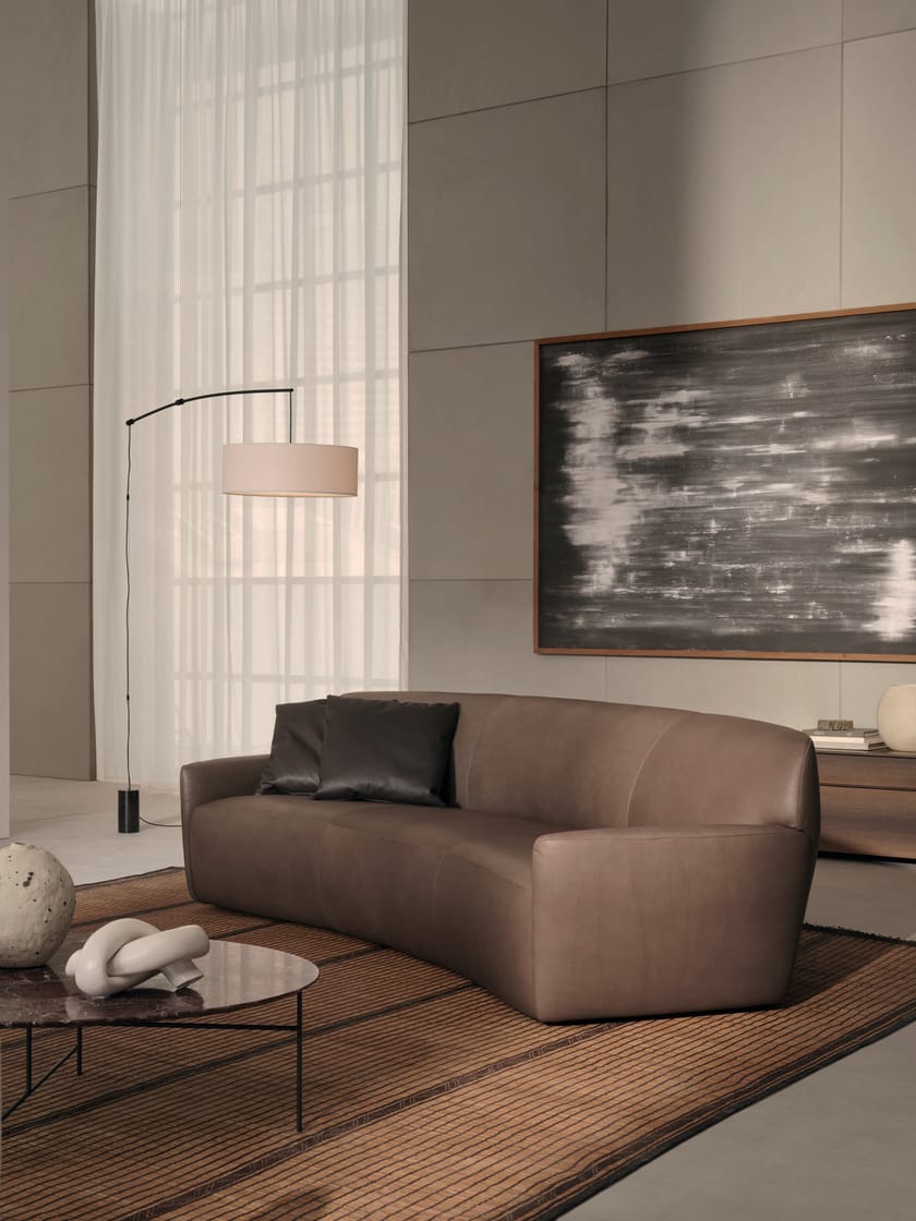 AMI Curved leather sofa By De Padova | design Yabu Pushelberg