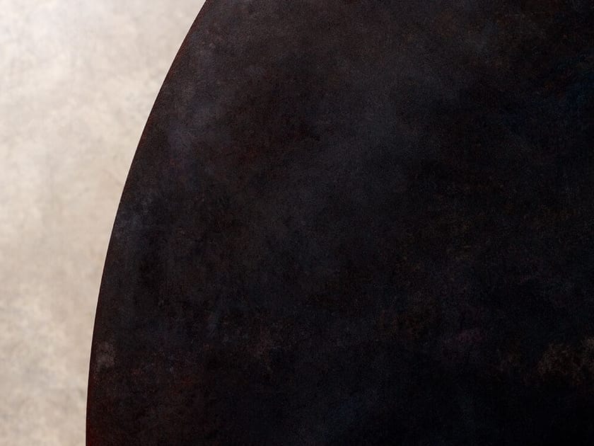 EBELL Round steel dining table By Kelly Wearstler