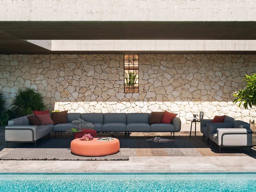ESTENDO Fabric garden armchair with armrests By RODA | design Luca Pevere
