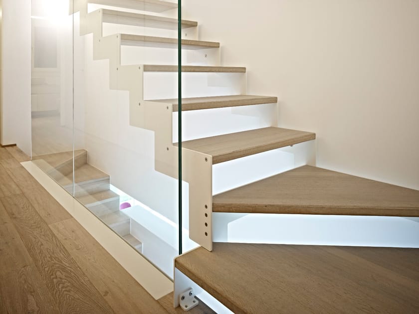 STAIR WITH SELF-SUPPORTING TREAD Three-crossed-layers wooden covering ...
