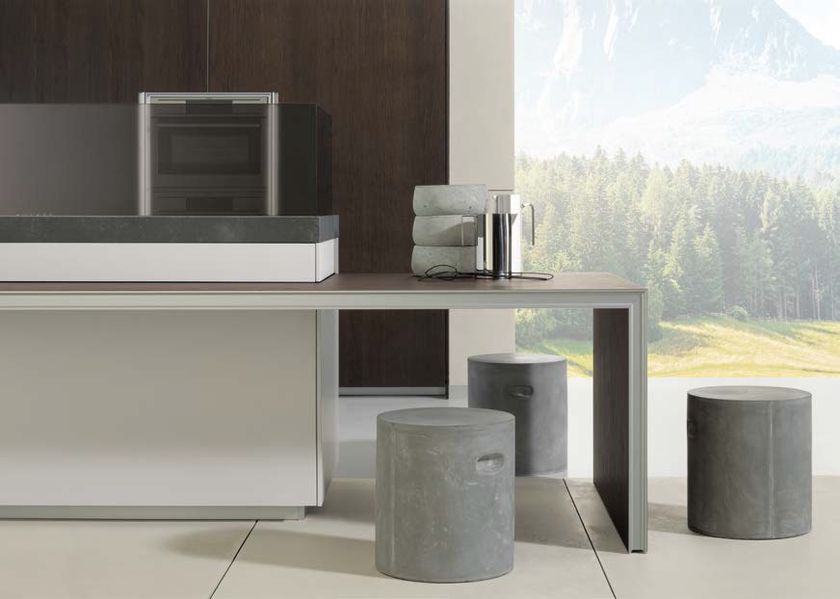 ICON Corian® kitchen with peninsula By ERNESTOMEDA | design Giuseppe Bavuso