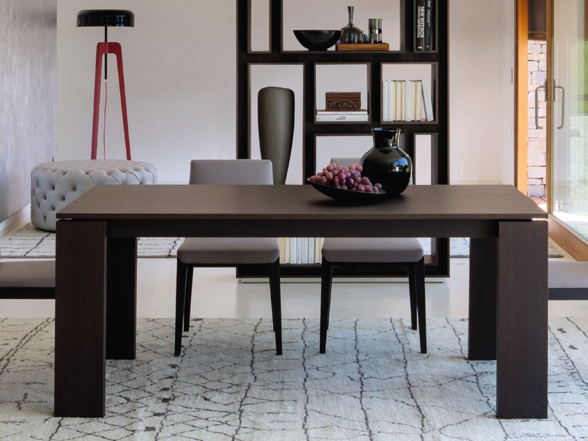 Extending walnut dining table KEVIN By Porada