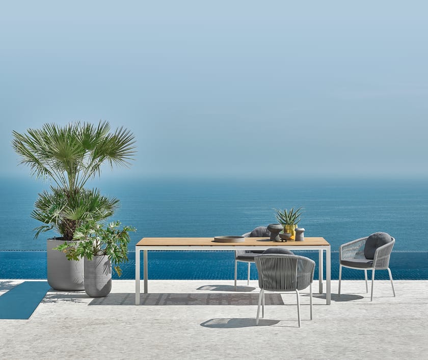 LOOP Upholstered fabric garden chair with armrests By Solpuri | design ...