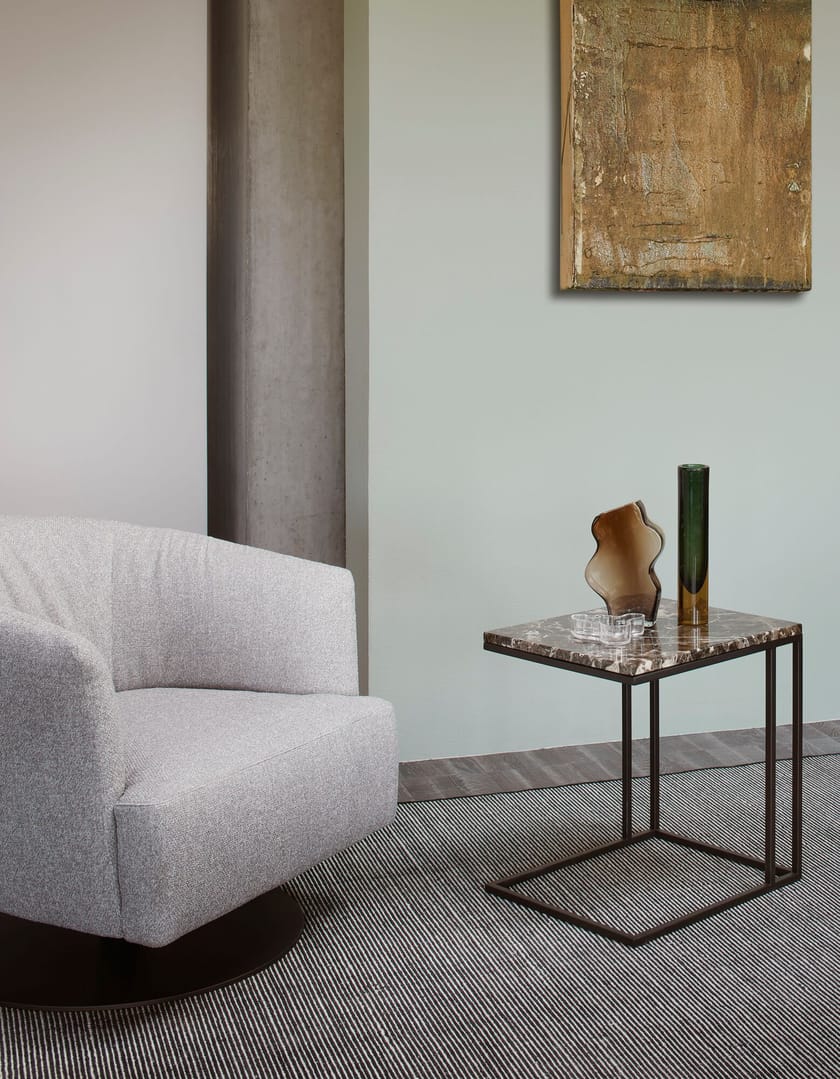 DIGA Swivel armchair with armrests By NICOLINE